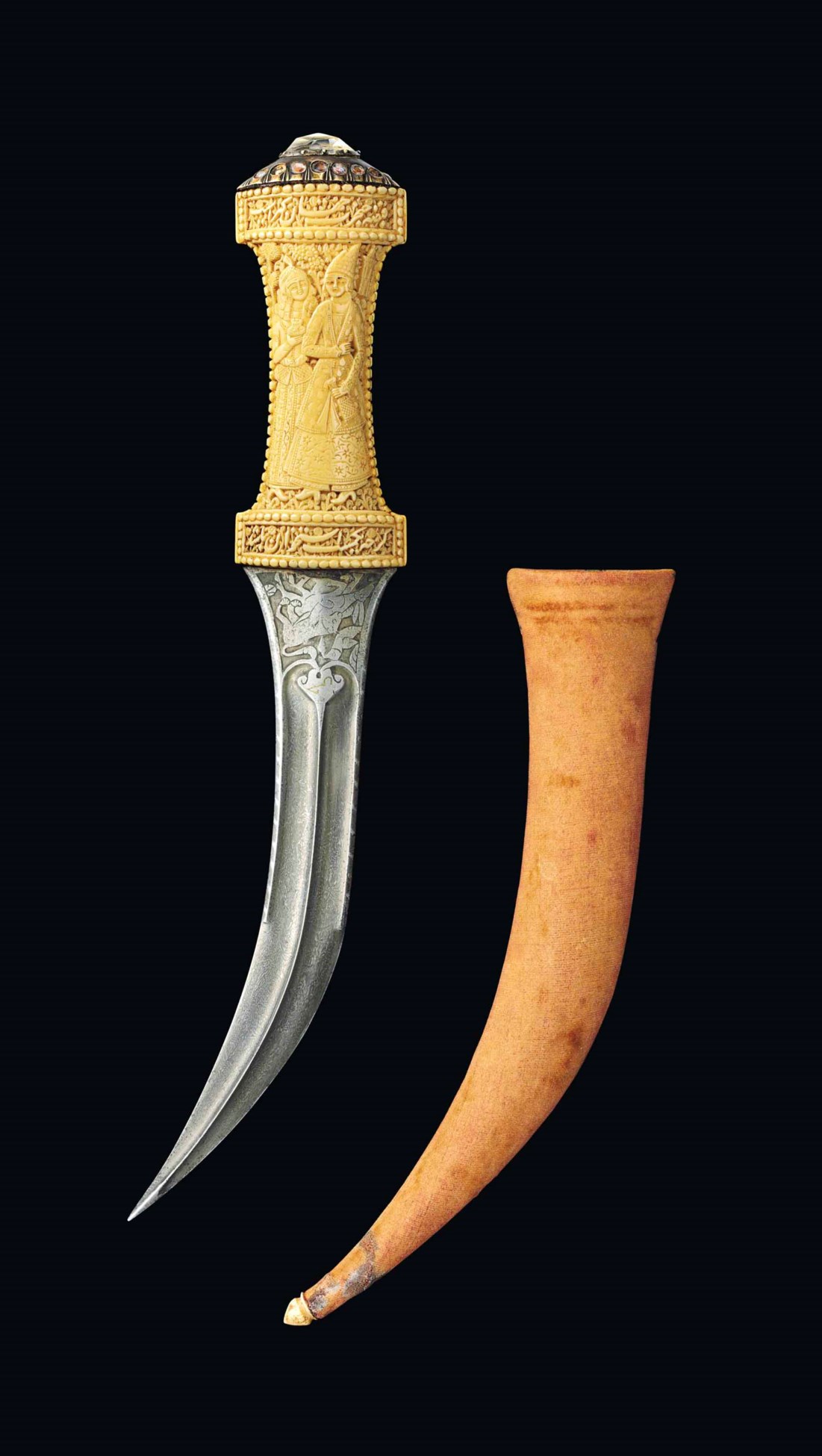 A QAJAR CARVED WALRUS-IVORY HILTED DAGGER (JAMBIYYA), THE HILT SIGNED ...