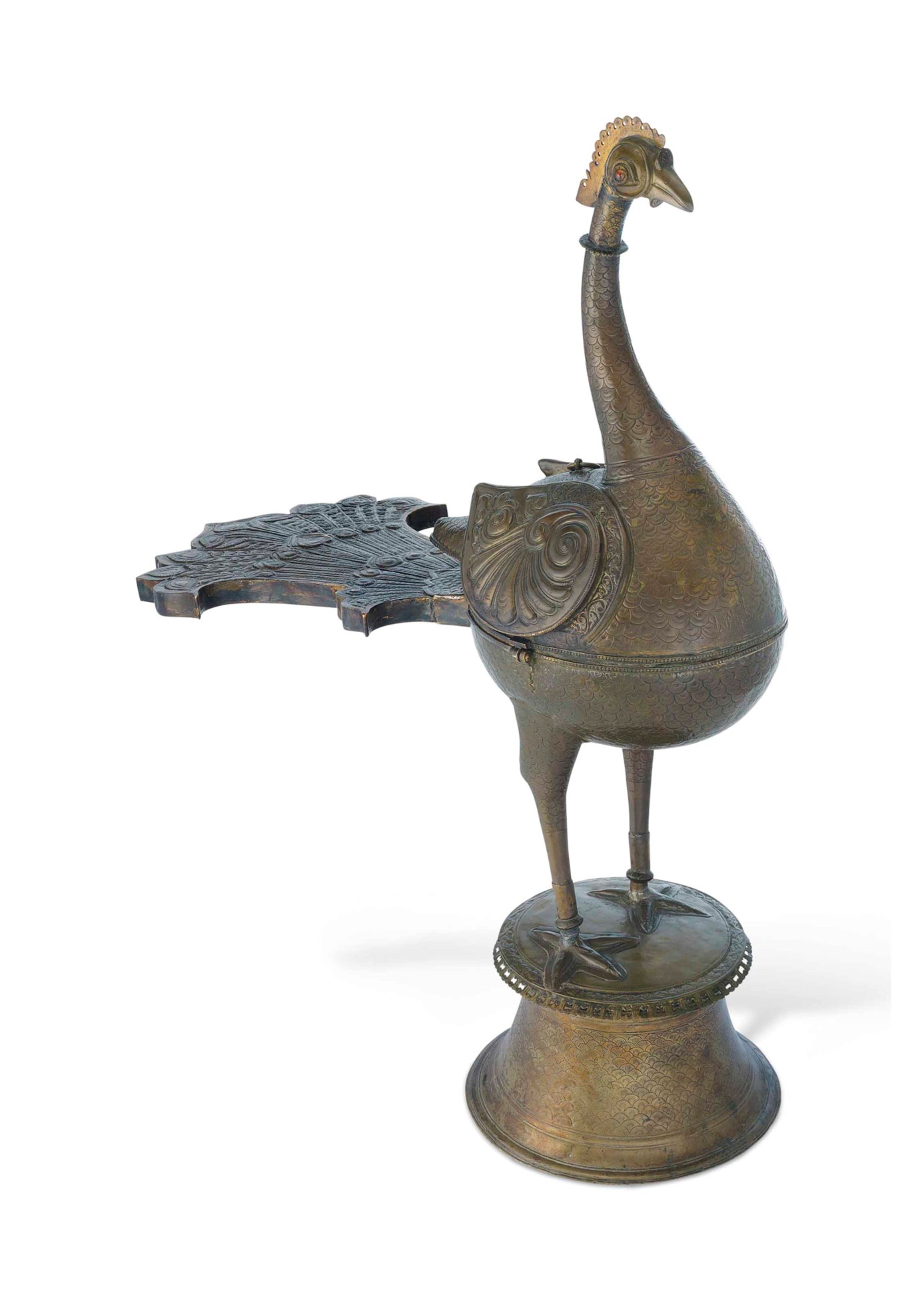 A DECCANI REPOUSSÉ AND ENGRAVED BRONZE PEACOCK, CENTRAL INDIA, 16TH ...