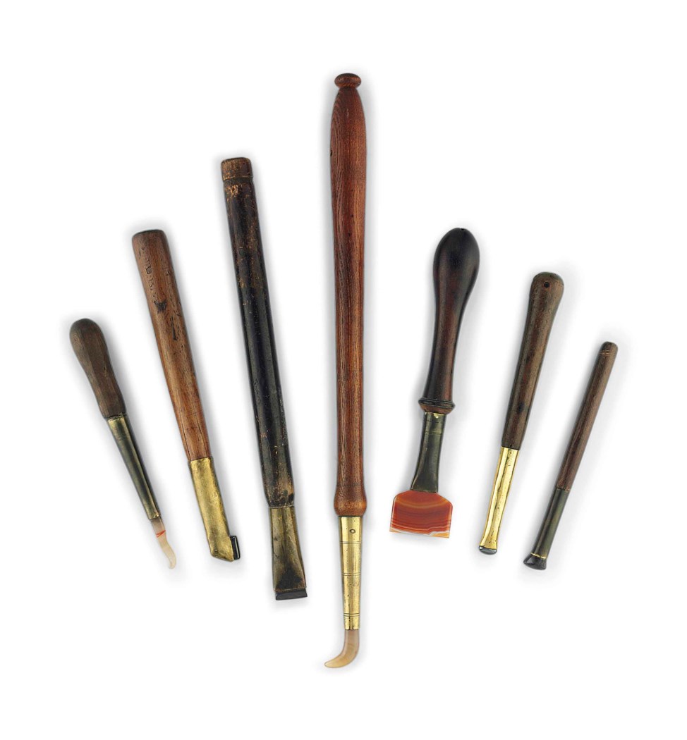 A CALLIGRAPHER'S COLLECTION OF PAPER BURNISHING AND SIZING TOOLS ...