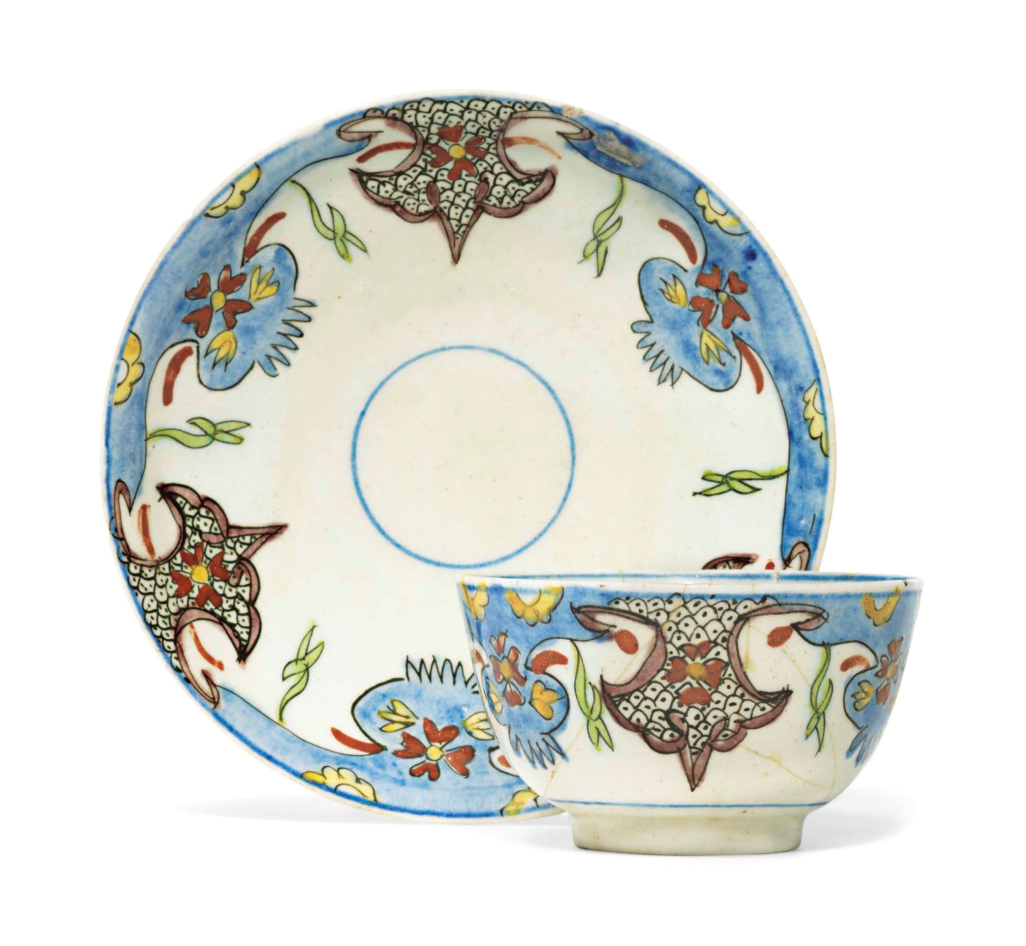 A KUTAHYA POTTERY CUP AND SAUCER, WESTERN ANATOLIA, 18TH CENTURY ...