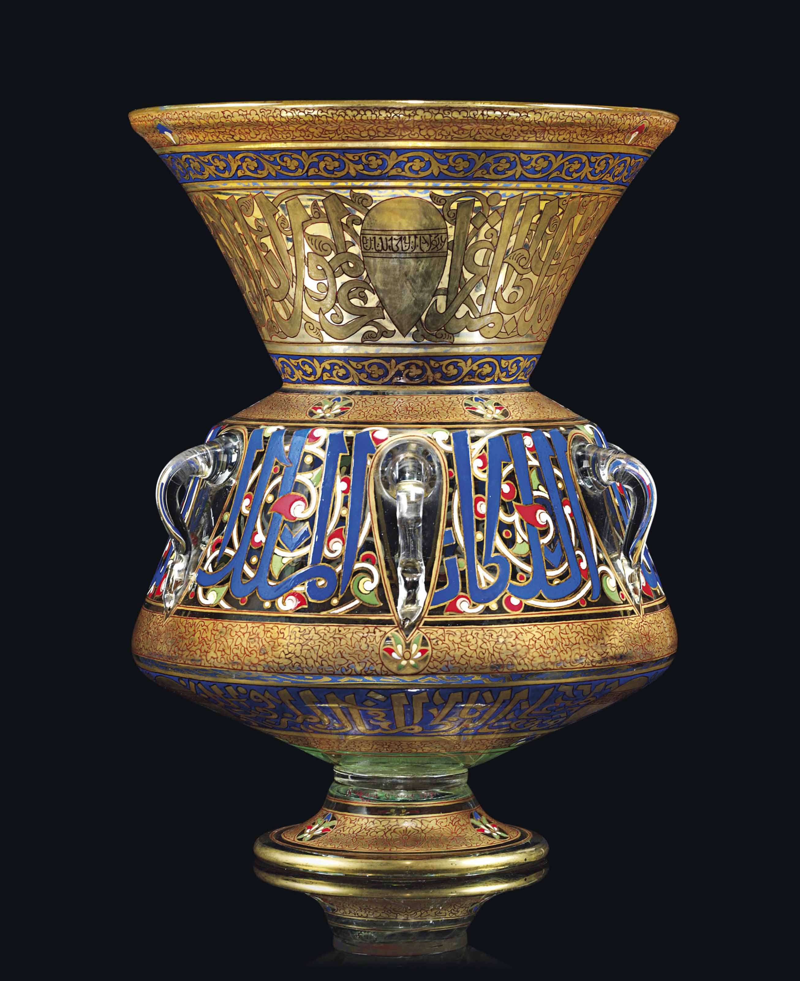 AN ENAMELLED AND GILDED GLASS MOSQUE LAMP