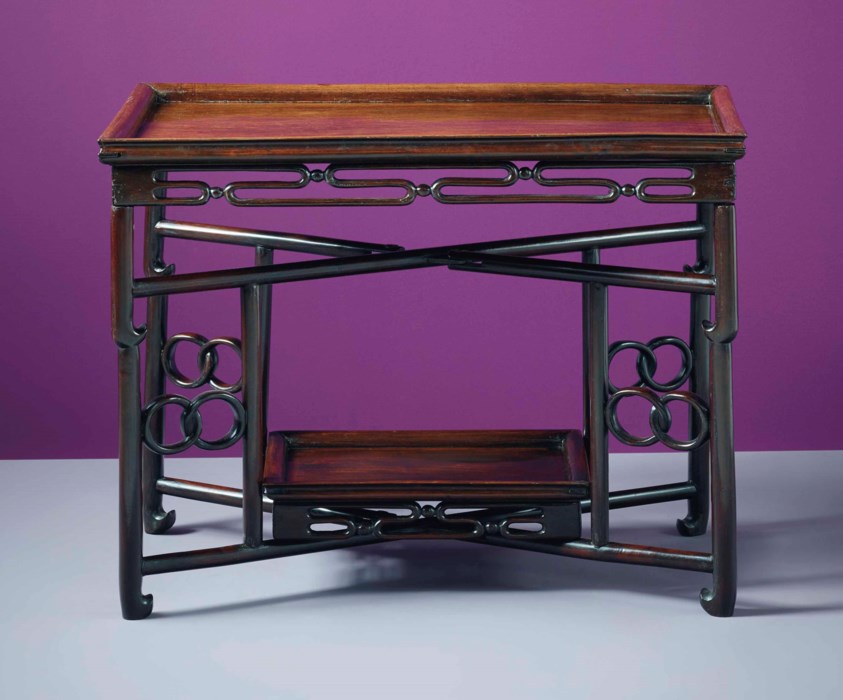 A CHINESE HARDWOOD FOLDING-TABLE
