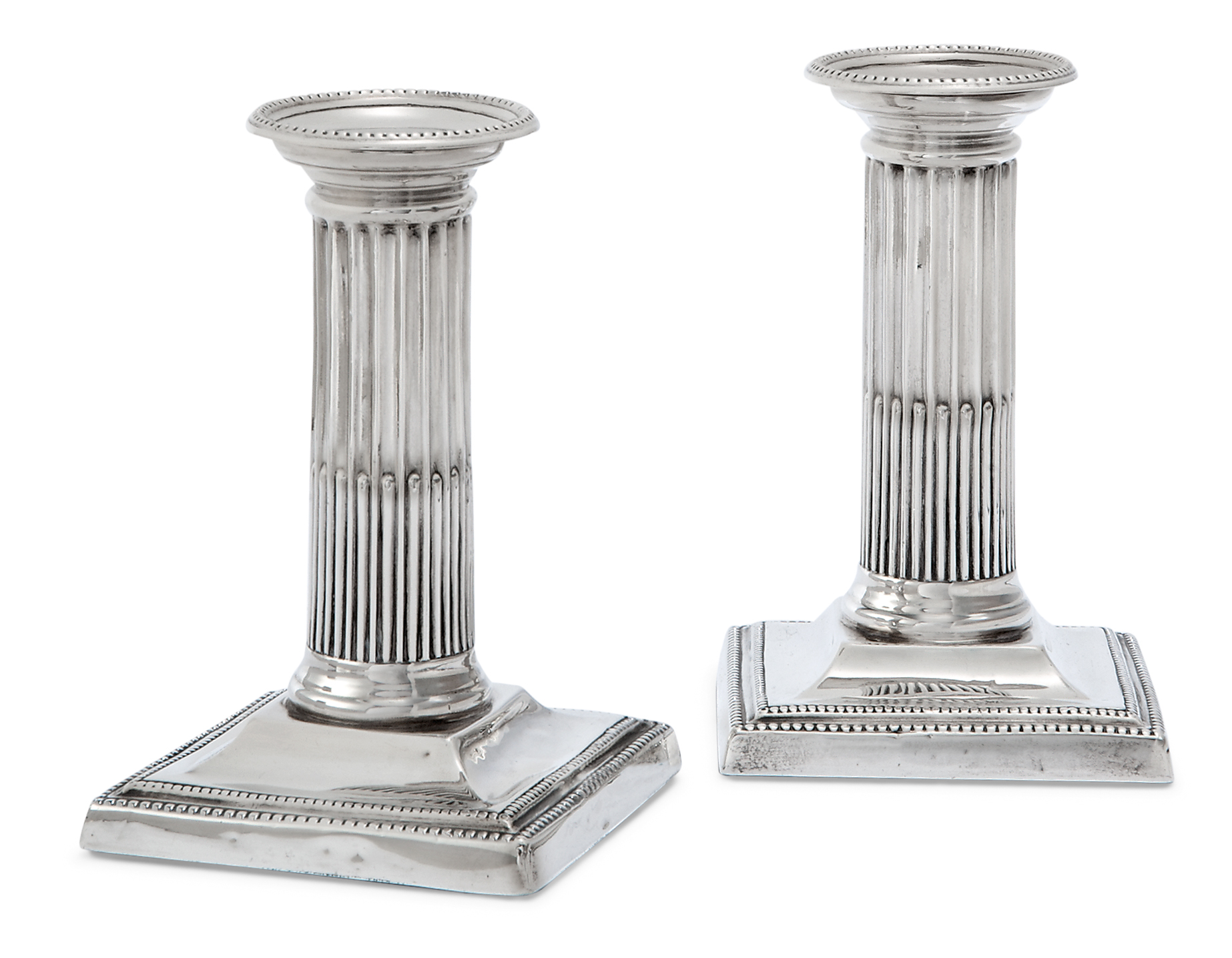 A PAIR OF GEORGE V SILVER DWARF COLUMN CANDLESTICKS, MARK OF MAPPIN AND ...