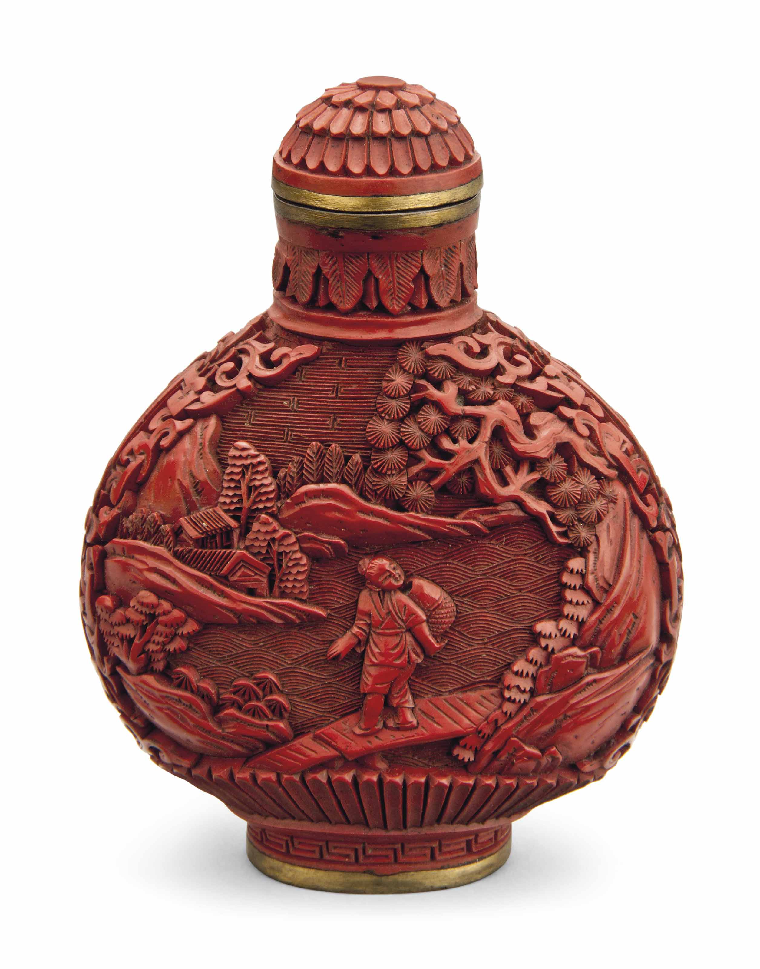 A CARVED CINNABAR LACQUER SNUFF BOTTLE