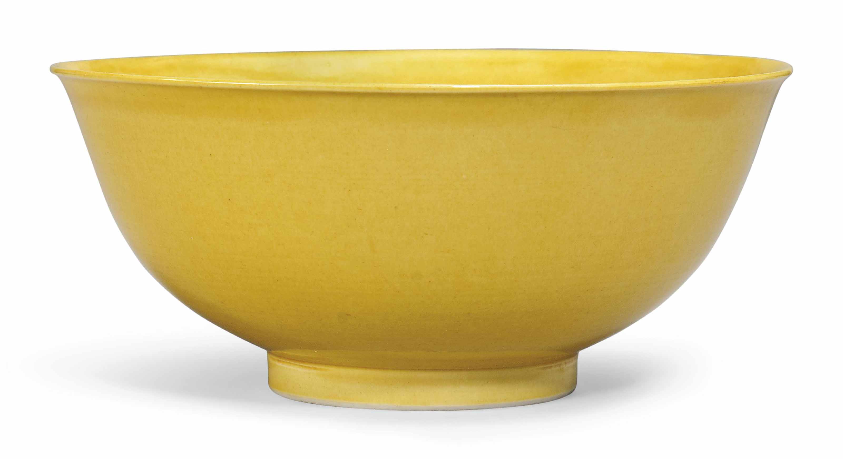 A YELLOW-GLAZED BOWL