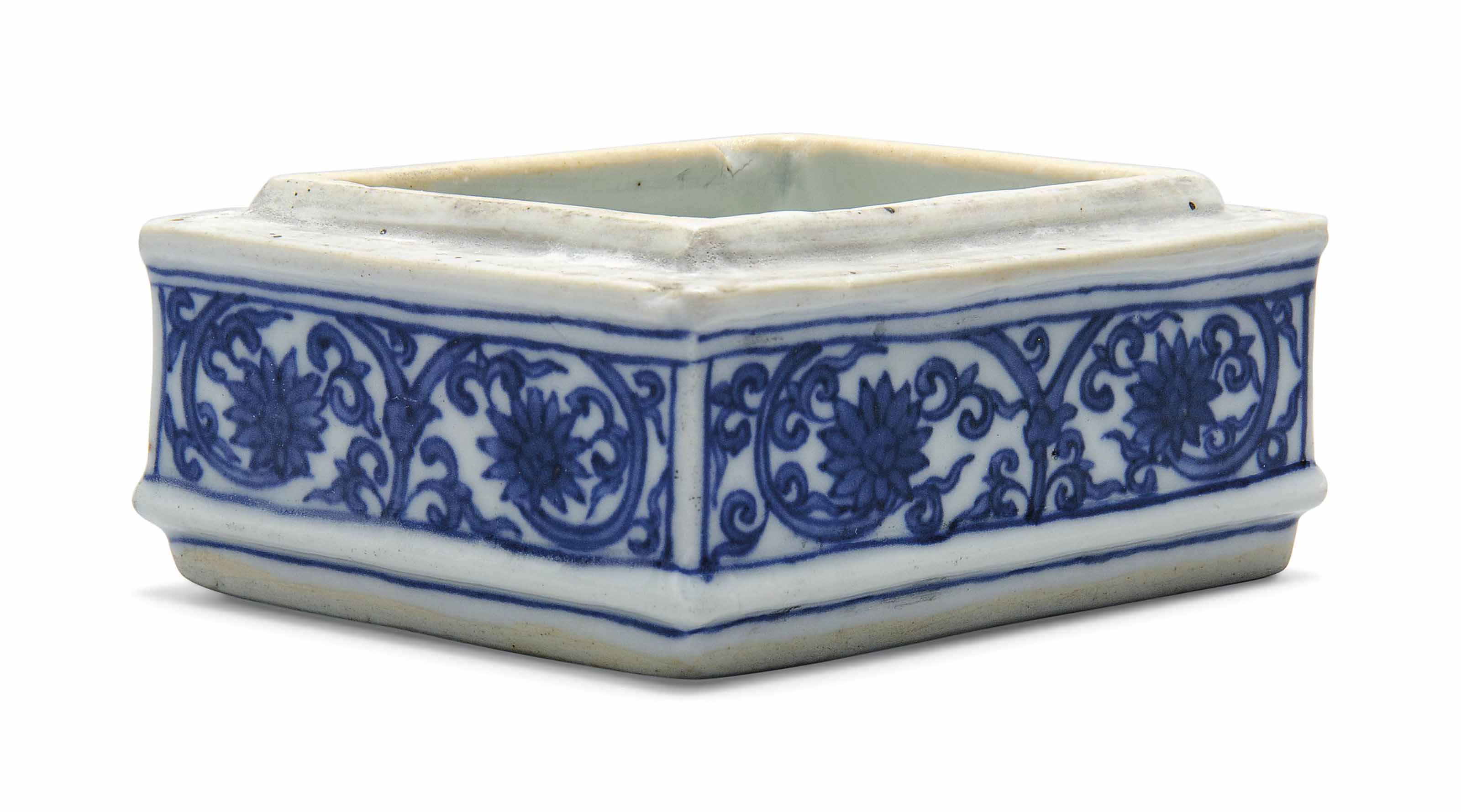 A BLUE AND WHITE RECTANGULAR 'LOTUS' BOX BASE