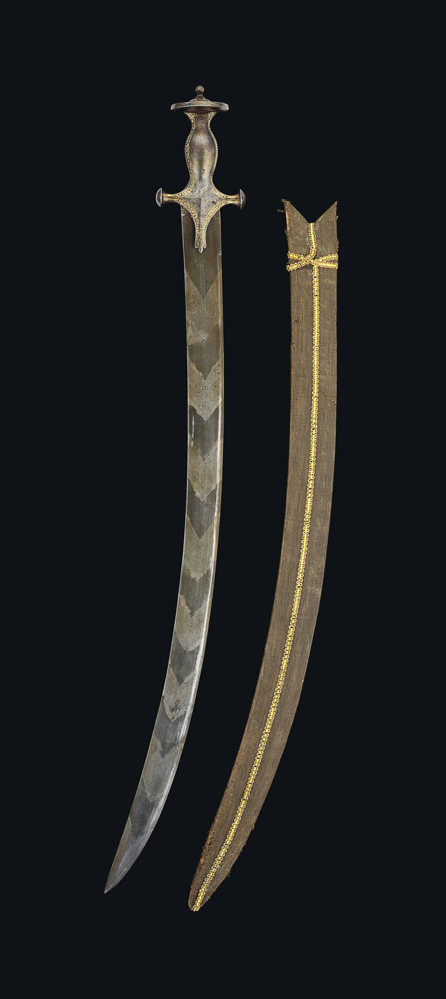 A CURVED SWORD (TULWAR) WITH CHEVRON WATERED-STEEL BLADE , NORTH INDIA ...