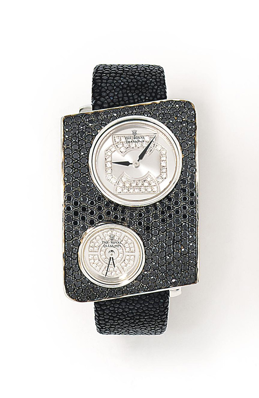 An 18ct white gold coloured diamond dual time quartz wristwatch, by The ...