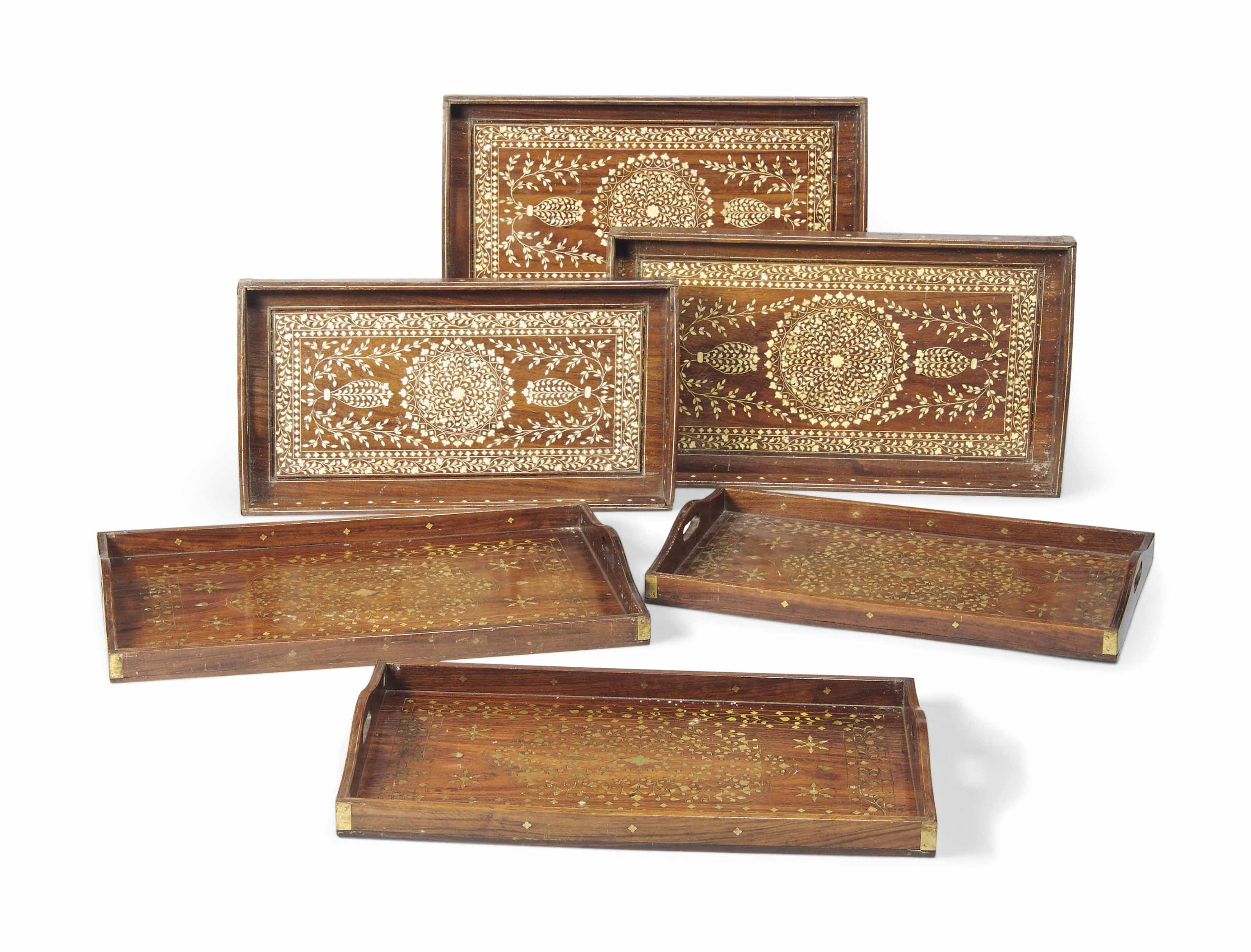 A SET OF THREE INDIAN TEAK AND BONE AND IVORY INLAID STACKING TRAYS