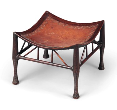 A LIBERTY & CO. OAK 'THEBES' STOOL, LATE 19TH CENTURY | Christie's