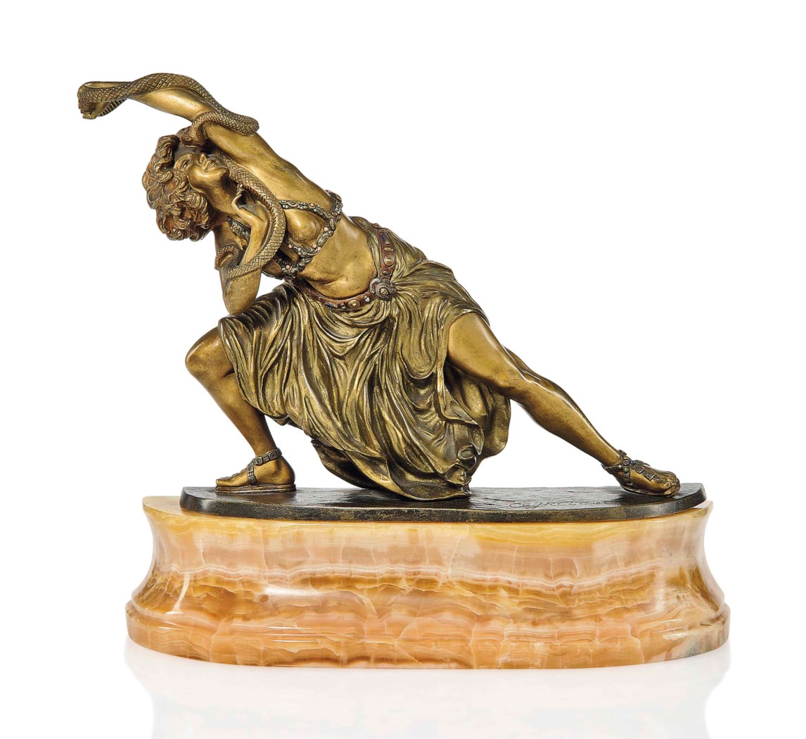 A CLAIRE-JEANNE-ROBERTE COLINET (1880-1950) PATINATED, GILT AND COLD ...