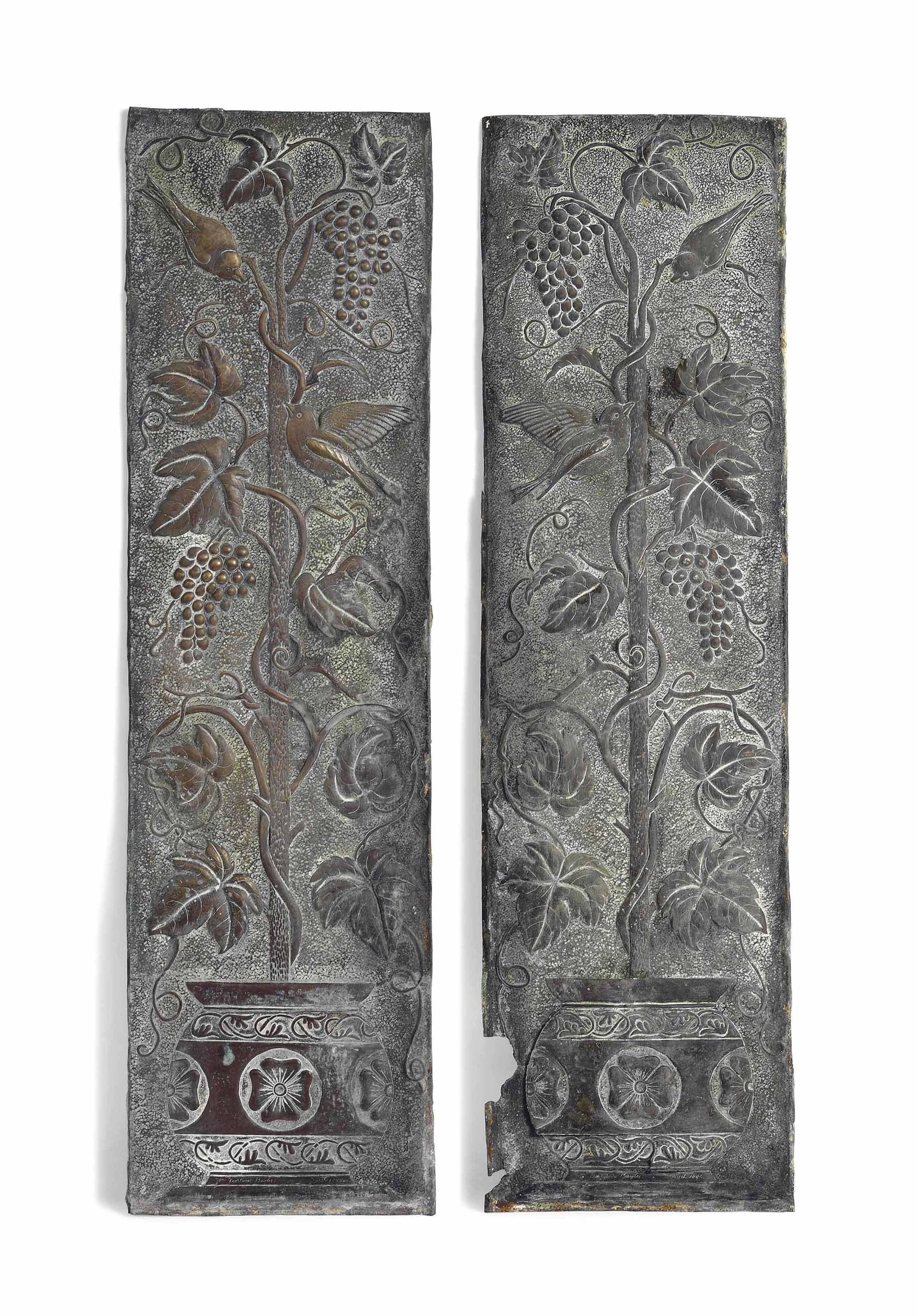 A PAIR OF ARTS AND CRAFTS EMBOSSED BRASS PANELS