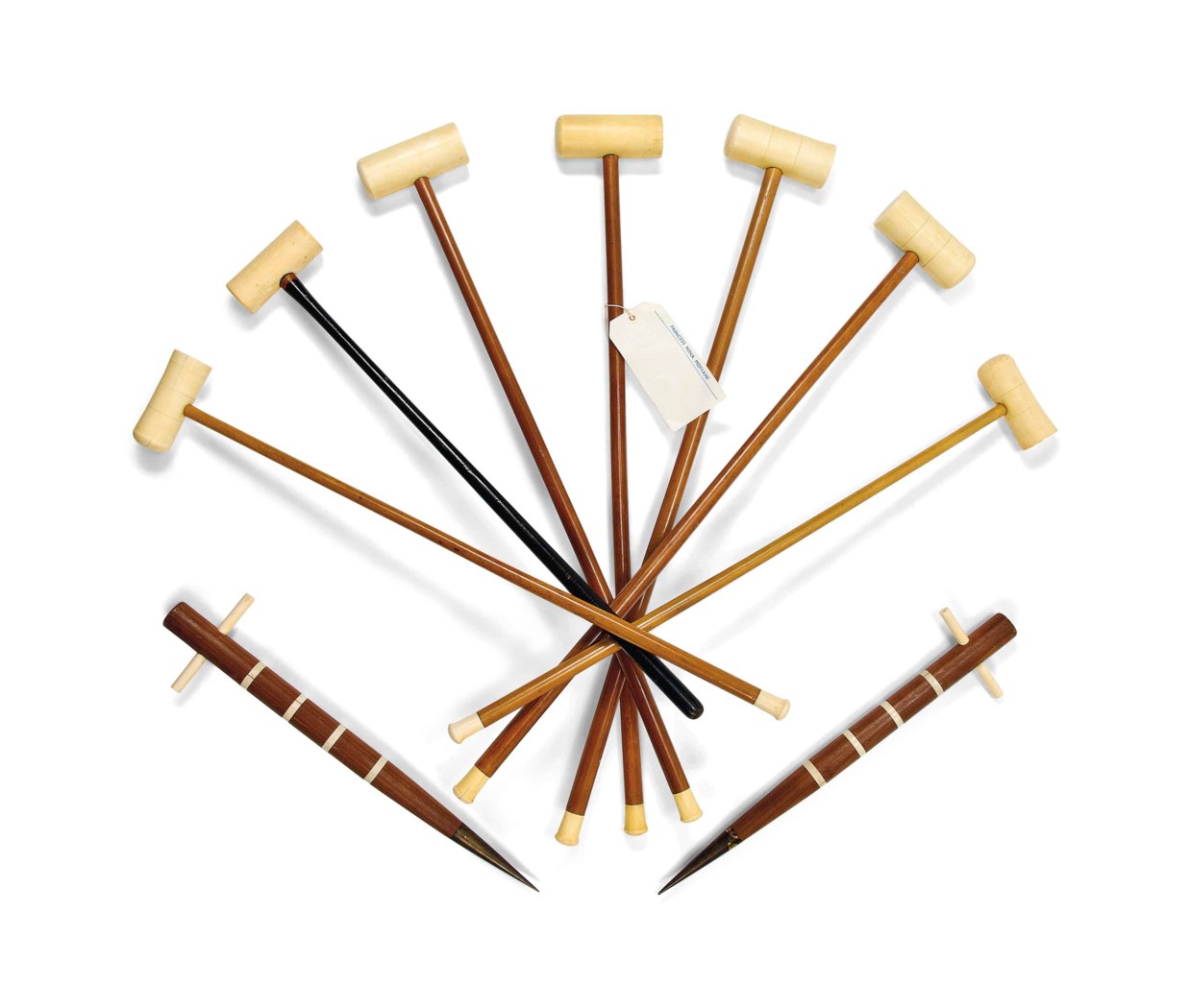 A MATCHED SET OF EIGHT INDIAN IVORY AND MALACCA CROQUET MALLETS, CIRCA ...