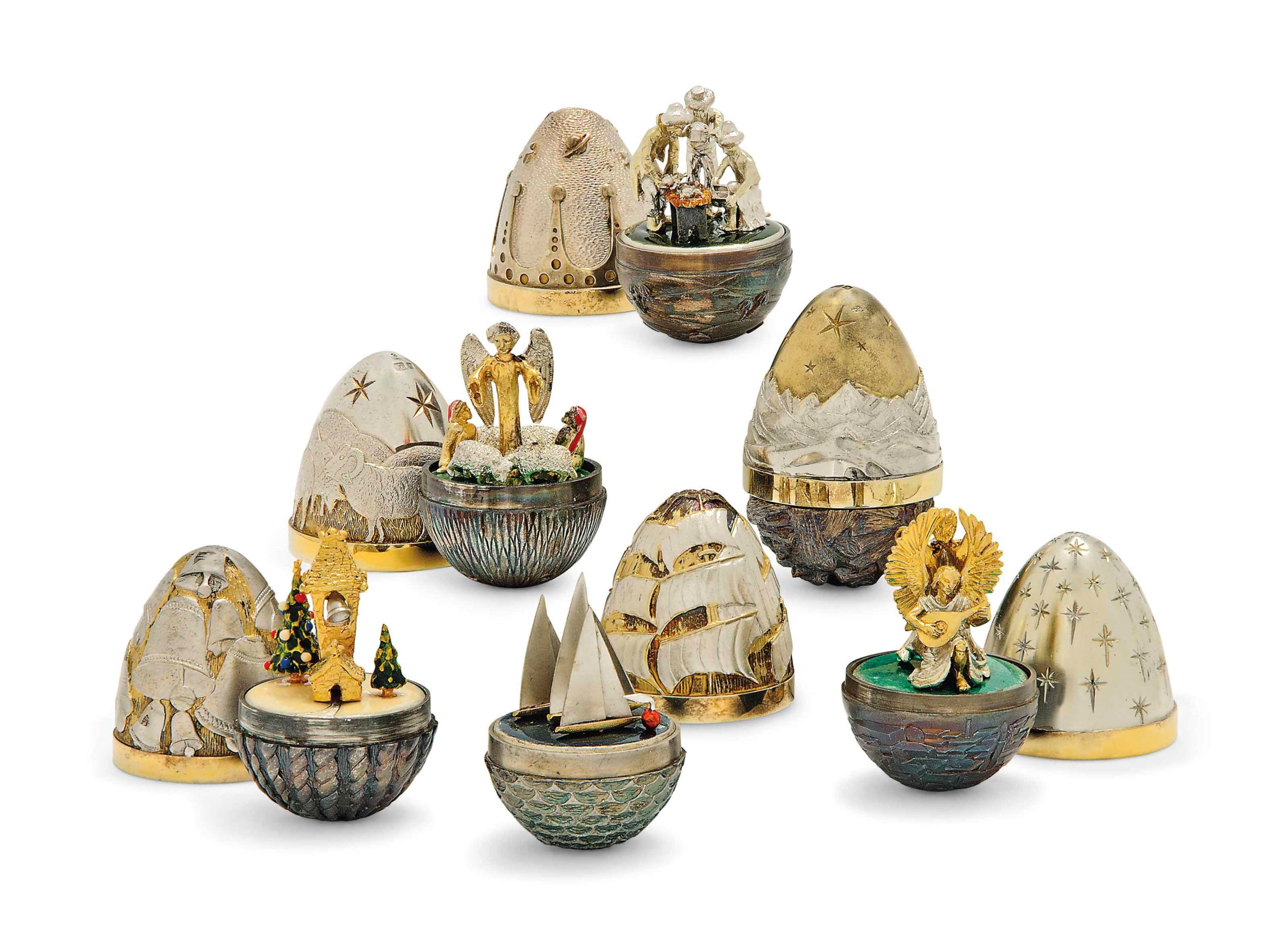 A SET OF SIX CHRISTMAS "SURPRISE" PARCEL-GILT AND ENAMEL EGGS, MARK OF ...