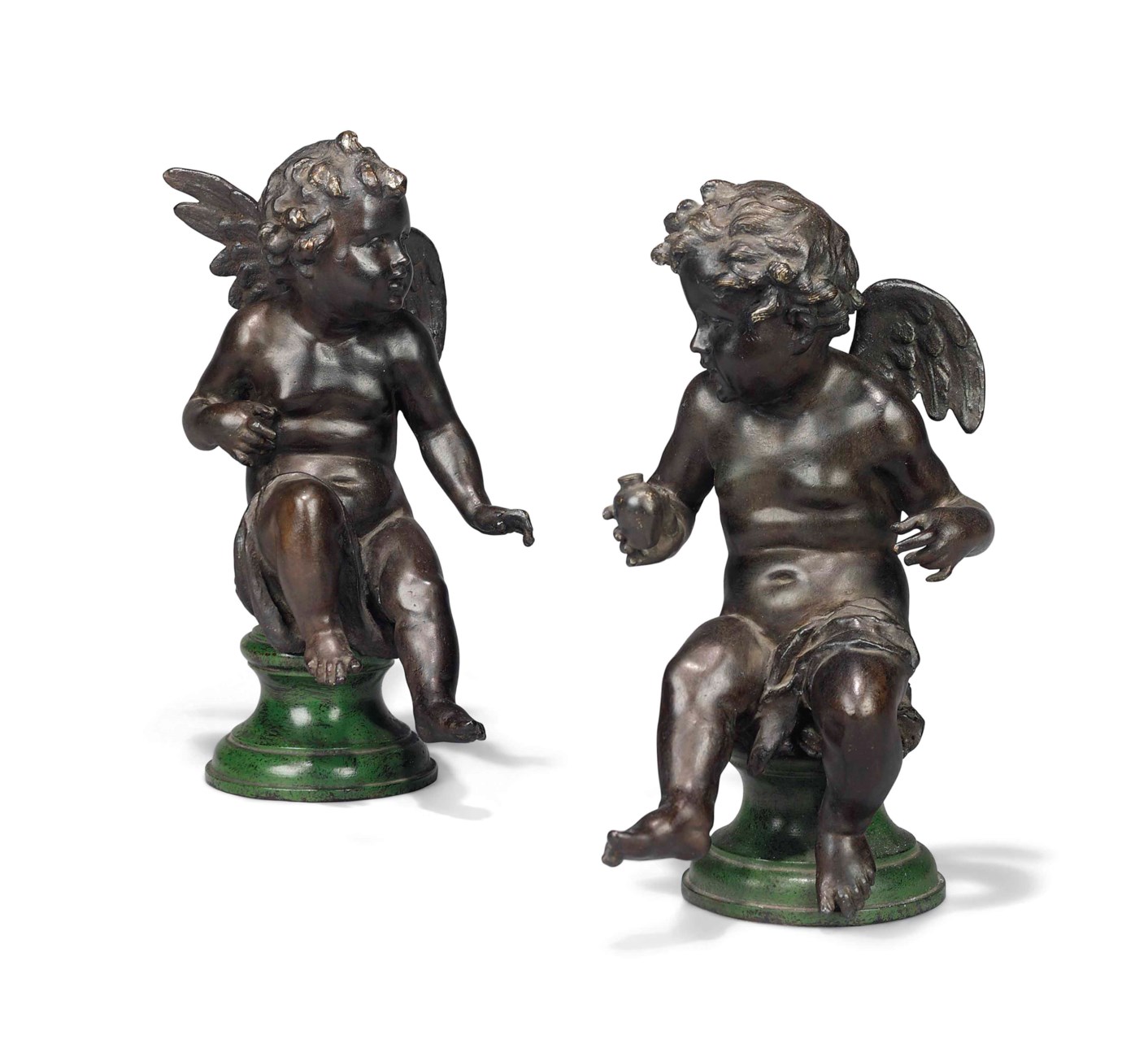 A NEAR PAIR OF ITALIAN PATINATED BRONZE PUTTI, MID-19TH CENTURY ...