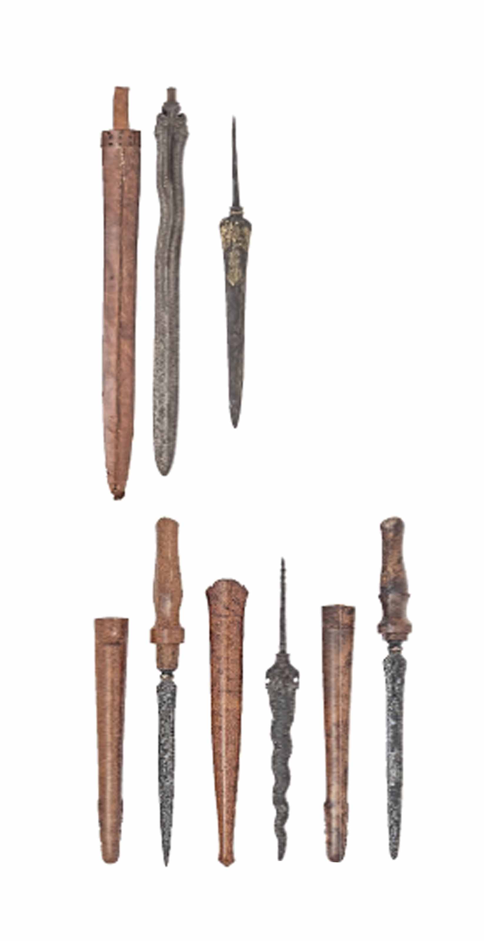 A LARGE GROUP OF JAVANESE TOMBAK (CEREMONIAL SPEAR TIPS)