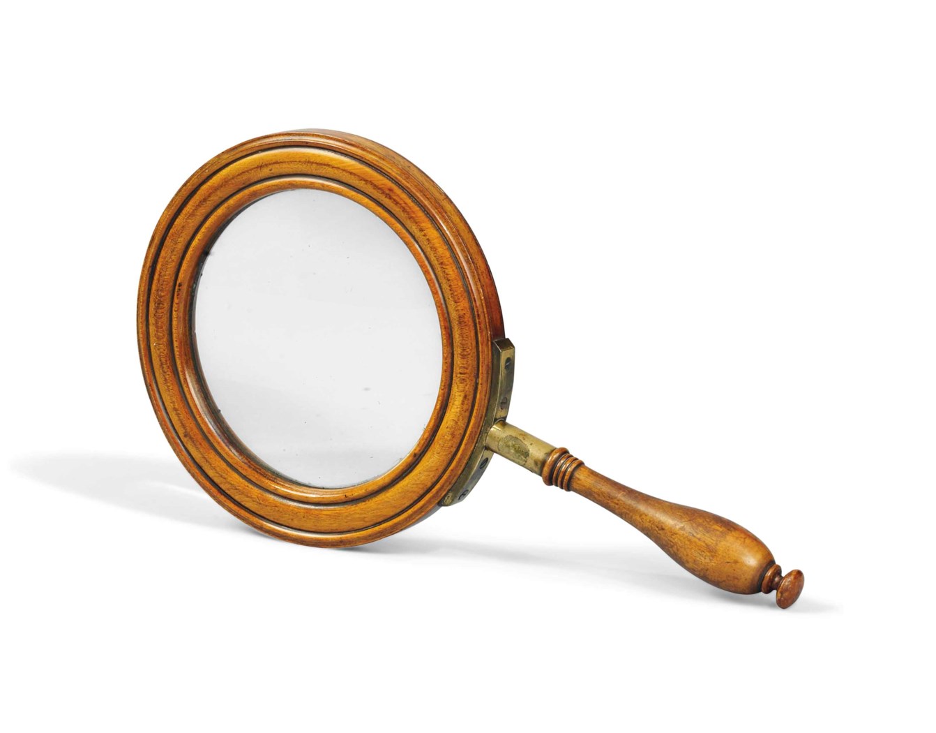 A VICTORIAN BIRCH LIBRARY MAGNIFYING GLASS, MID-19TH CENTURY | Christie's