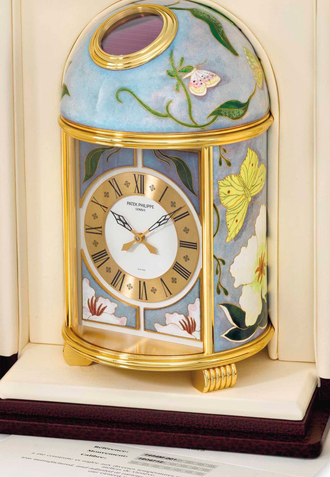 Patek Philippe. A very fine and unique gilt brass solar-powered table ...
