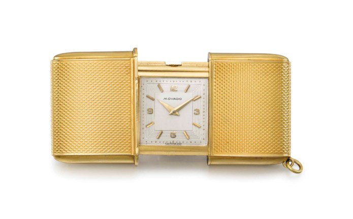 Movado. An 18K gold rectangular travelling purse watch , SIGNED MOVADO ...