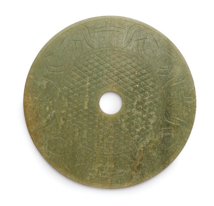 A CARVED GREEN JADE DISC, BI , HAN DYNASTY (206 BC - AD 220) | Christie's