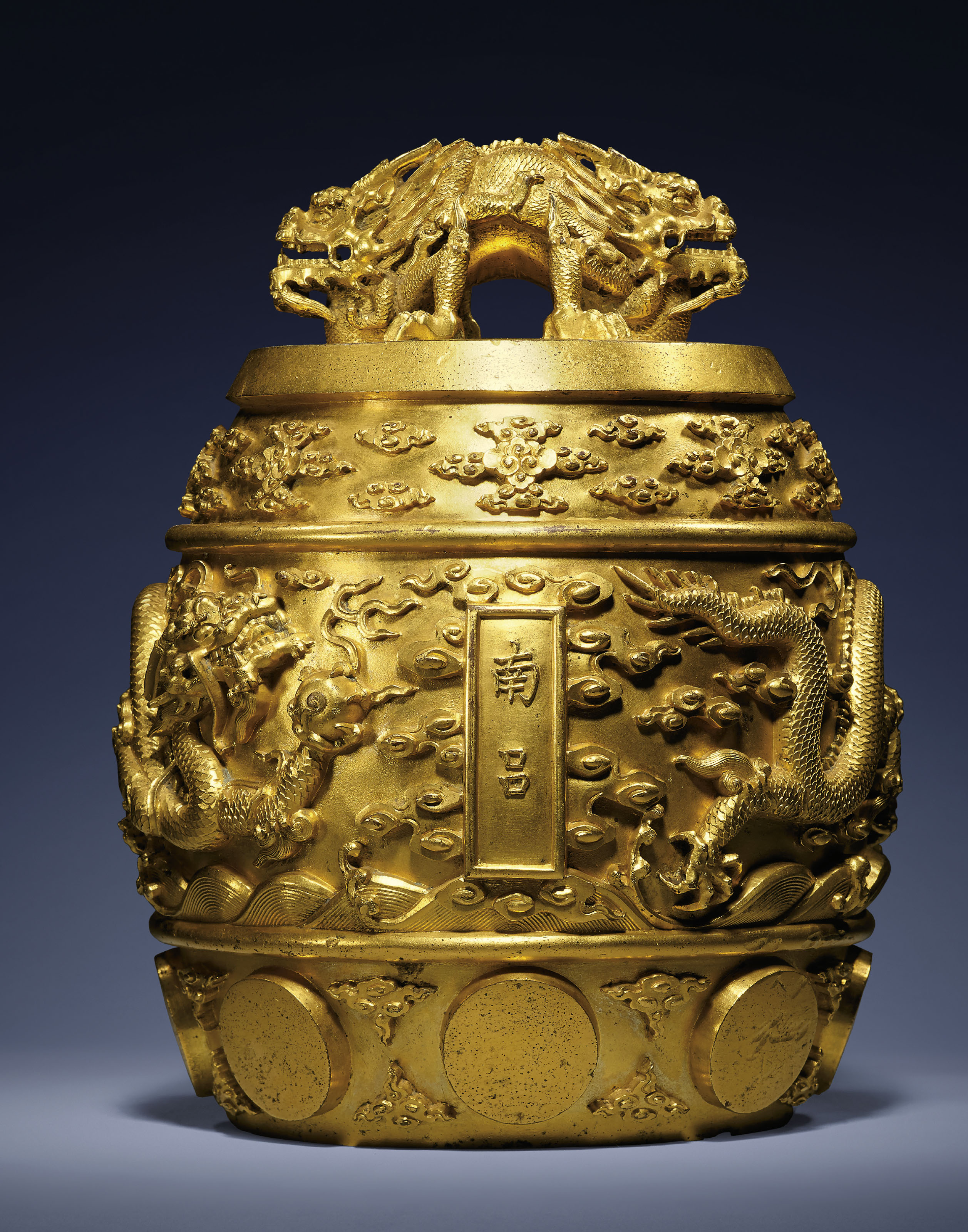 A RARE IMPERIAL GILT-BRONZE 'DRAGON' RITUAL BELL, BIANZHONG