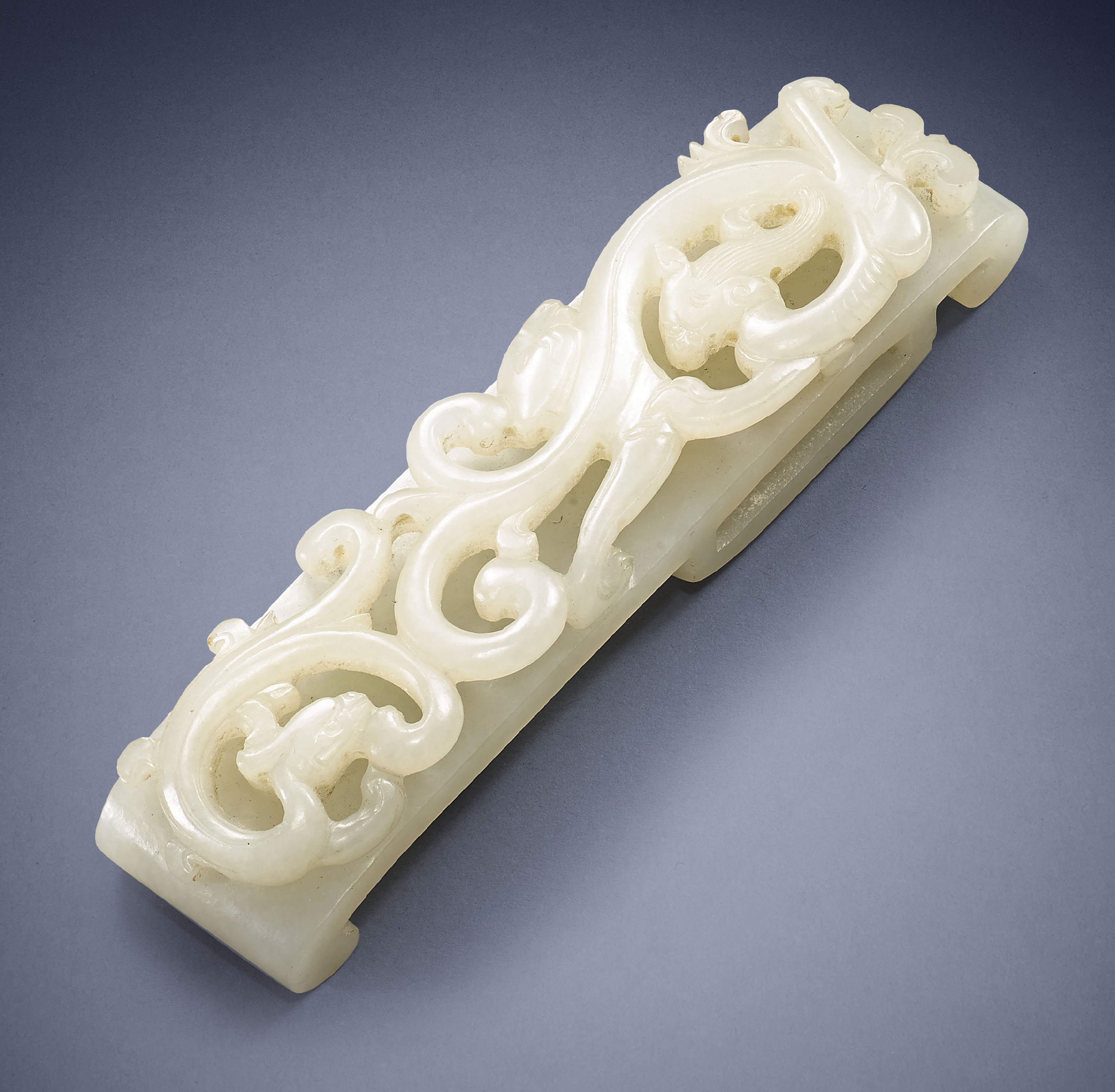 A WHITE JADE SWORD SLIDE