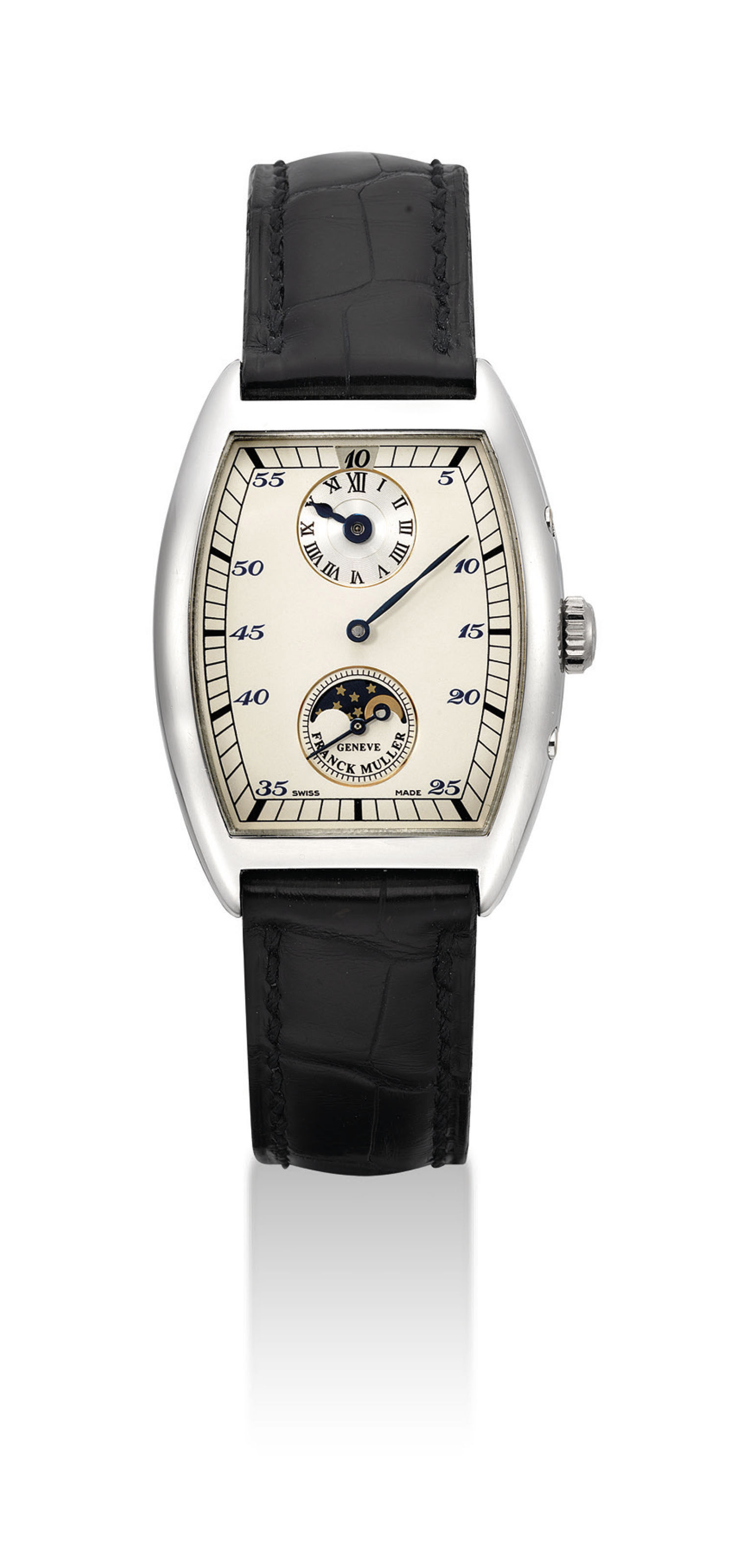 FRANCK MULLER. A FINE PLATINUM TONNEAU-SHAPED DUAL TIME JUMP HOUR ...