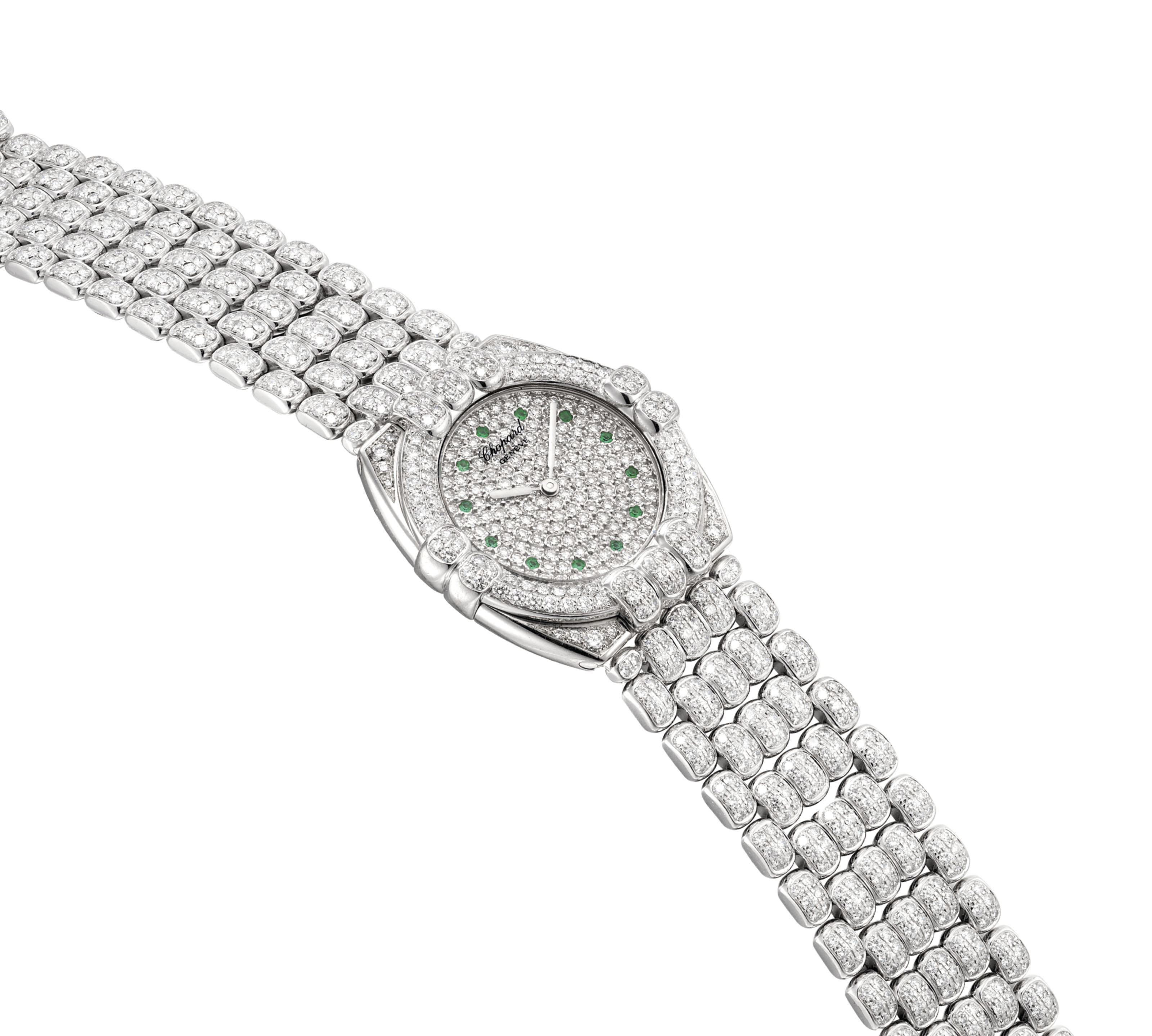 CHOPARD. AN 18K WHITE GOLD, DIAMOND AND EMERALD-SET TONNEAU-SHAPED ...