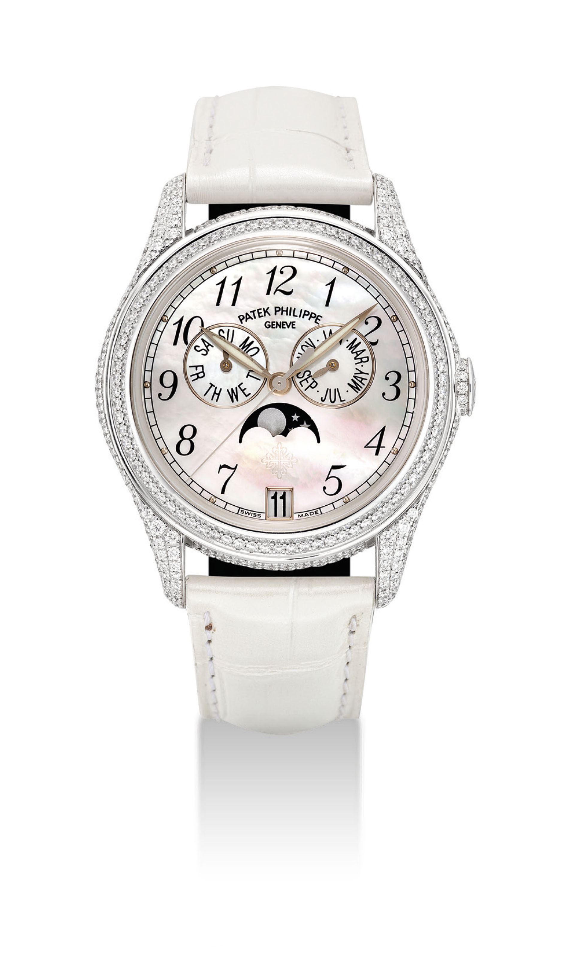PATEK PHILIPPE. A LADY’S FINE AND ATTRACTIVE 18K WHITE GOLD AND DIAMOND ...