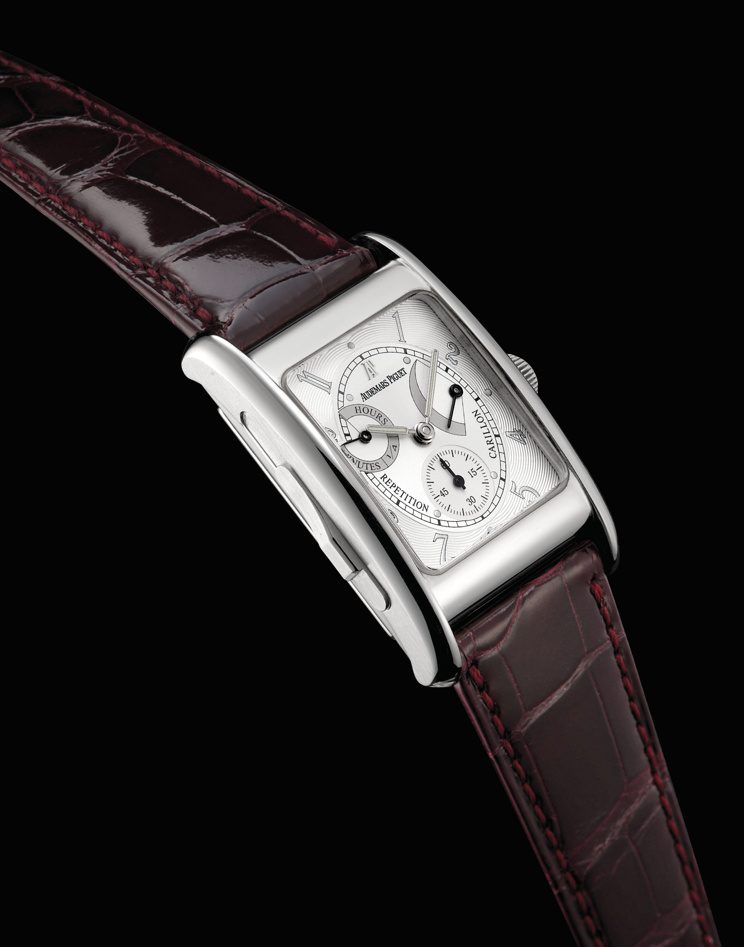 AUDEMARS PIGUET. A FINE AND RARE PLATINUM LIMITED EDITION RECTANGULAR ...