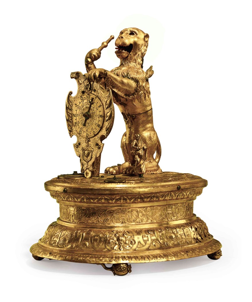 A GERMAN ENGRAVED GILT-BRASS AND COPPER STRIKING AND AUTOMATON LION ...