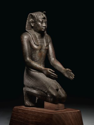AN EGYPTIAN BRONZE FIGURE OF PHARAOH NECHO II, LATE PERIOD, 26TH ...