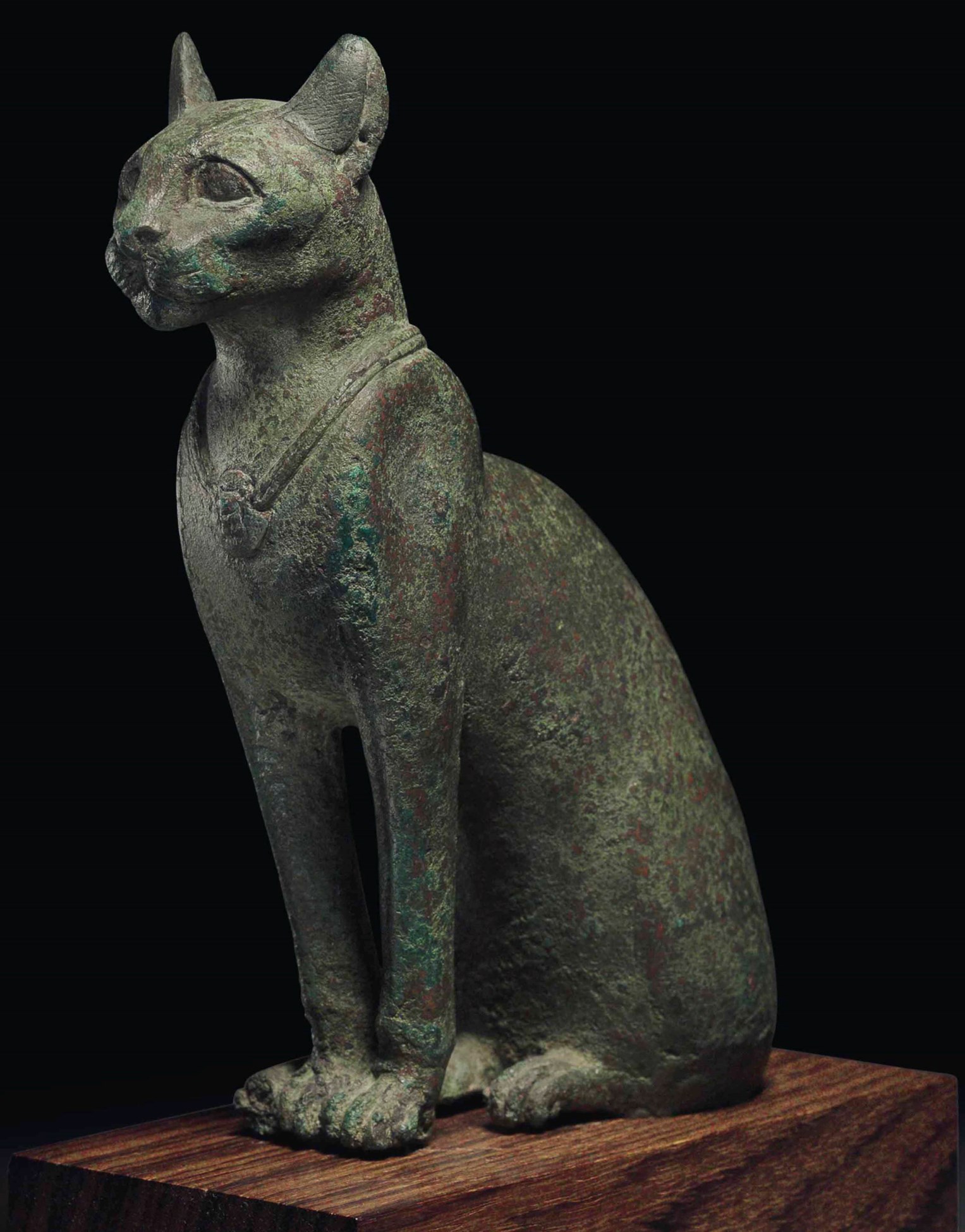 AN EGYPTIAN BRONZE CAT, PTOLEMAIC PERIOD, 304-30 B.C. | Christie's