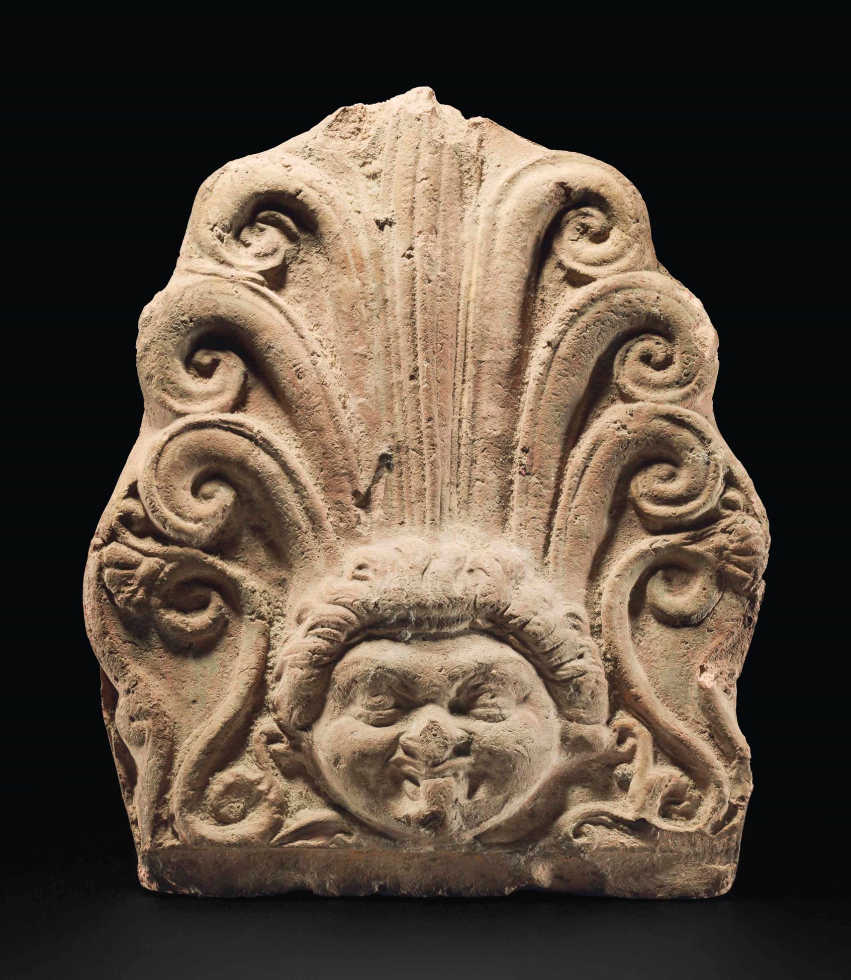 A ROMAN TERRACOTTA ANTEFIX, CIRCA SECOND HALF OF THE 1ST CENTURY B.C ...