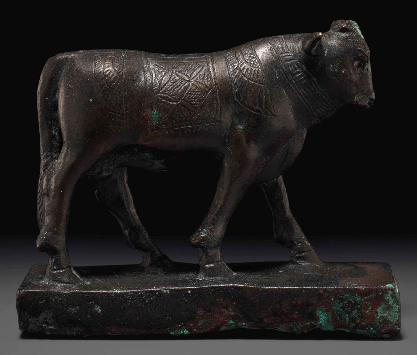 AN EGYPTIAN BRONZE APIS BULL, LATE PERIOD TO PTOLEMAIC PERIOD, 664-30 B ...