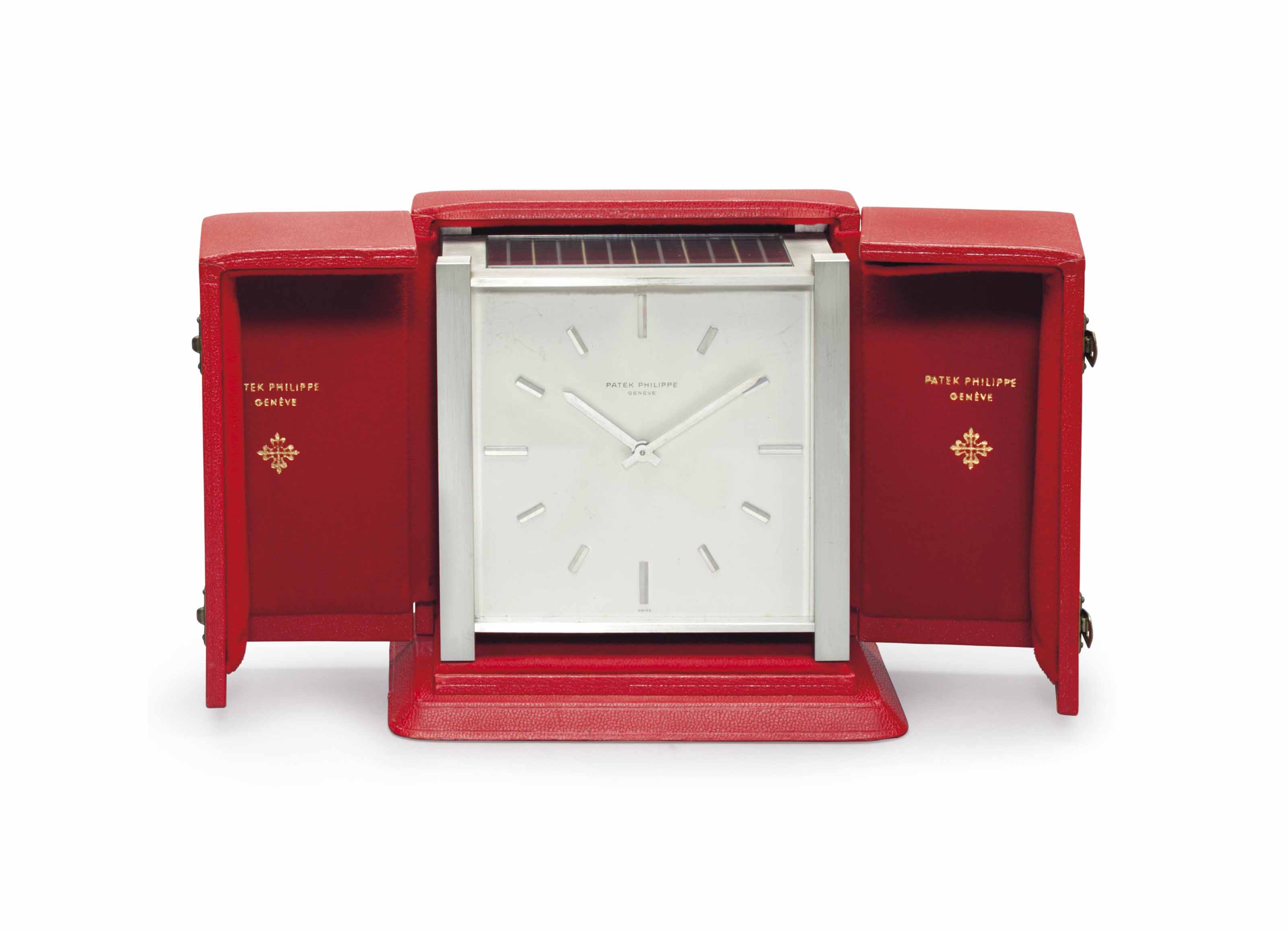 Patek Philippe. A Fine Rhodium-Plated Silver Square-Shaped Solar ...