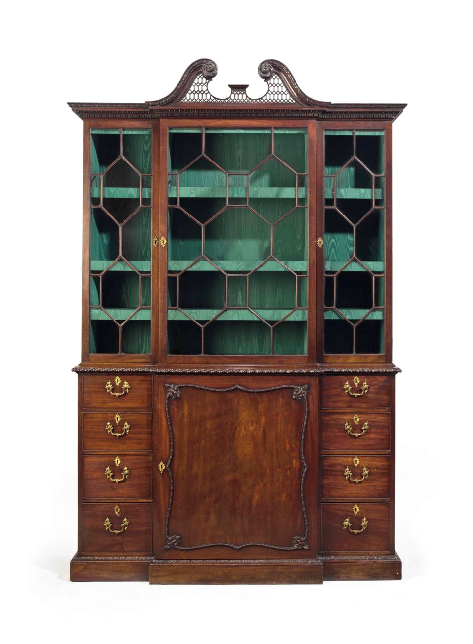 AN EARLY GEORGE III MAHOGANY BREAKFRONT BOOKCASE, CIRCA 1760 | Christie's
