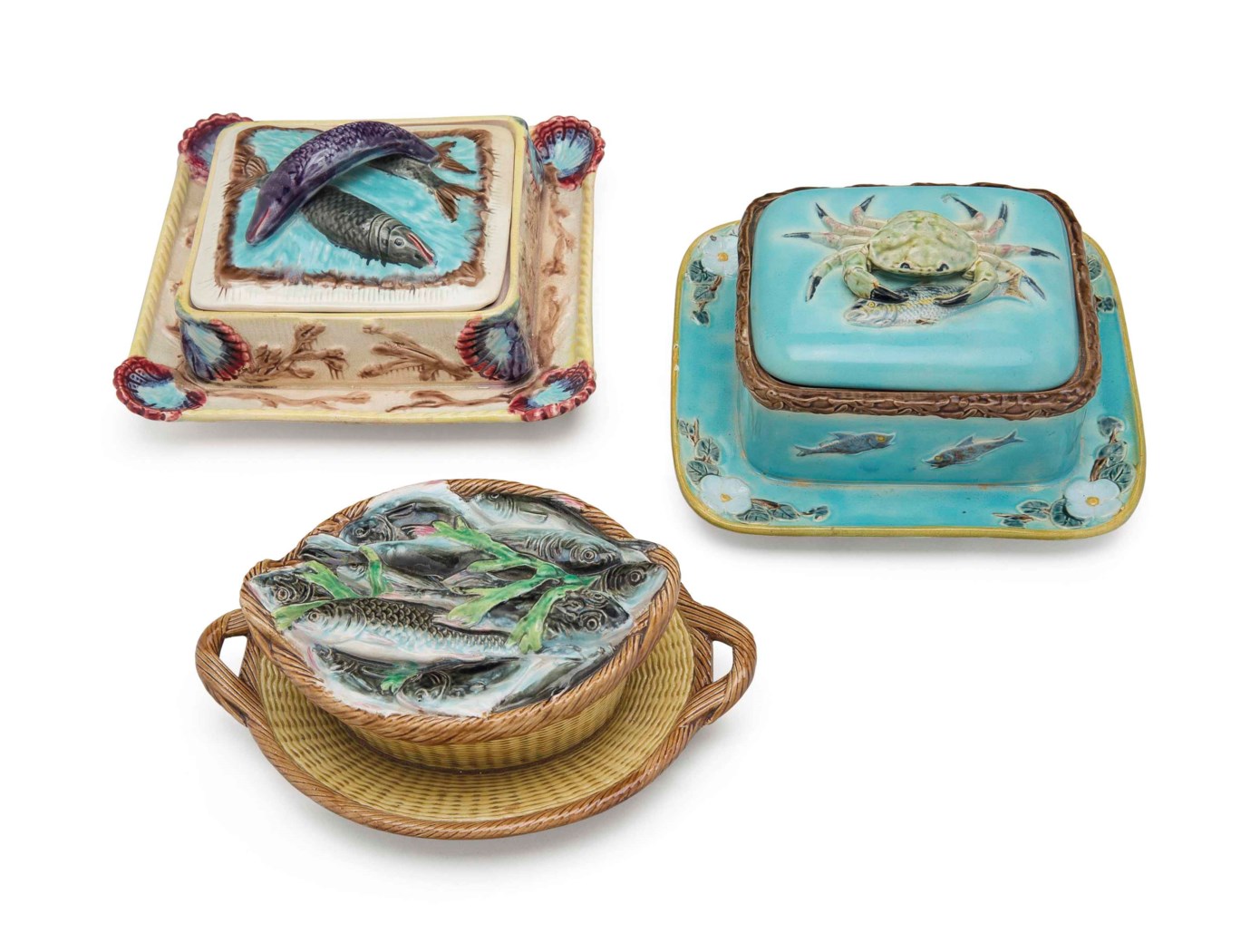 THREE ENGLISH MAJOLICA SARDINE BOXES AND COVERS