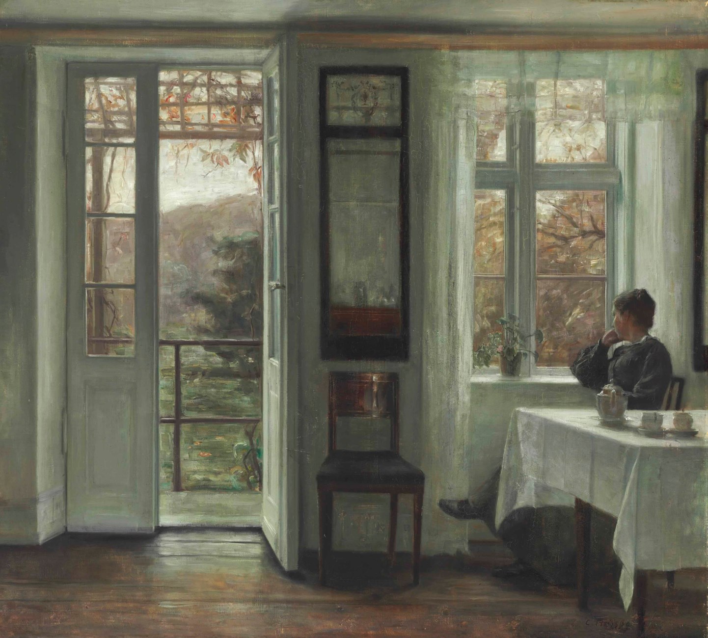 Carl Vilhelm Holsøe (Danish, 1863-1935), The Artist's Wife sitting at a ...