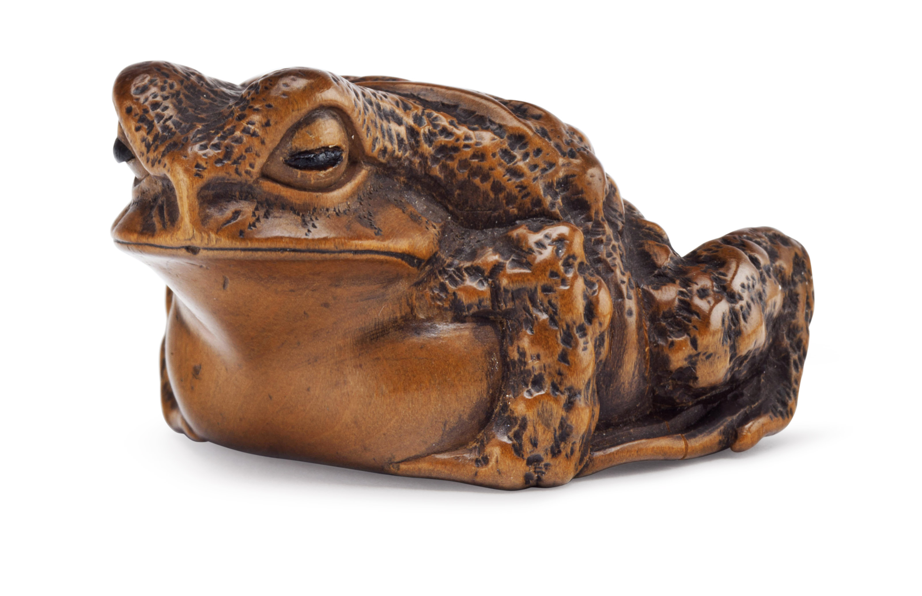 SIGNED MASAKATSU, EDO PERIOD (19TH CENTURY), A carved wood netsuke of a ...