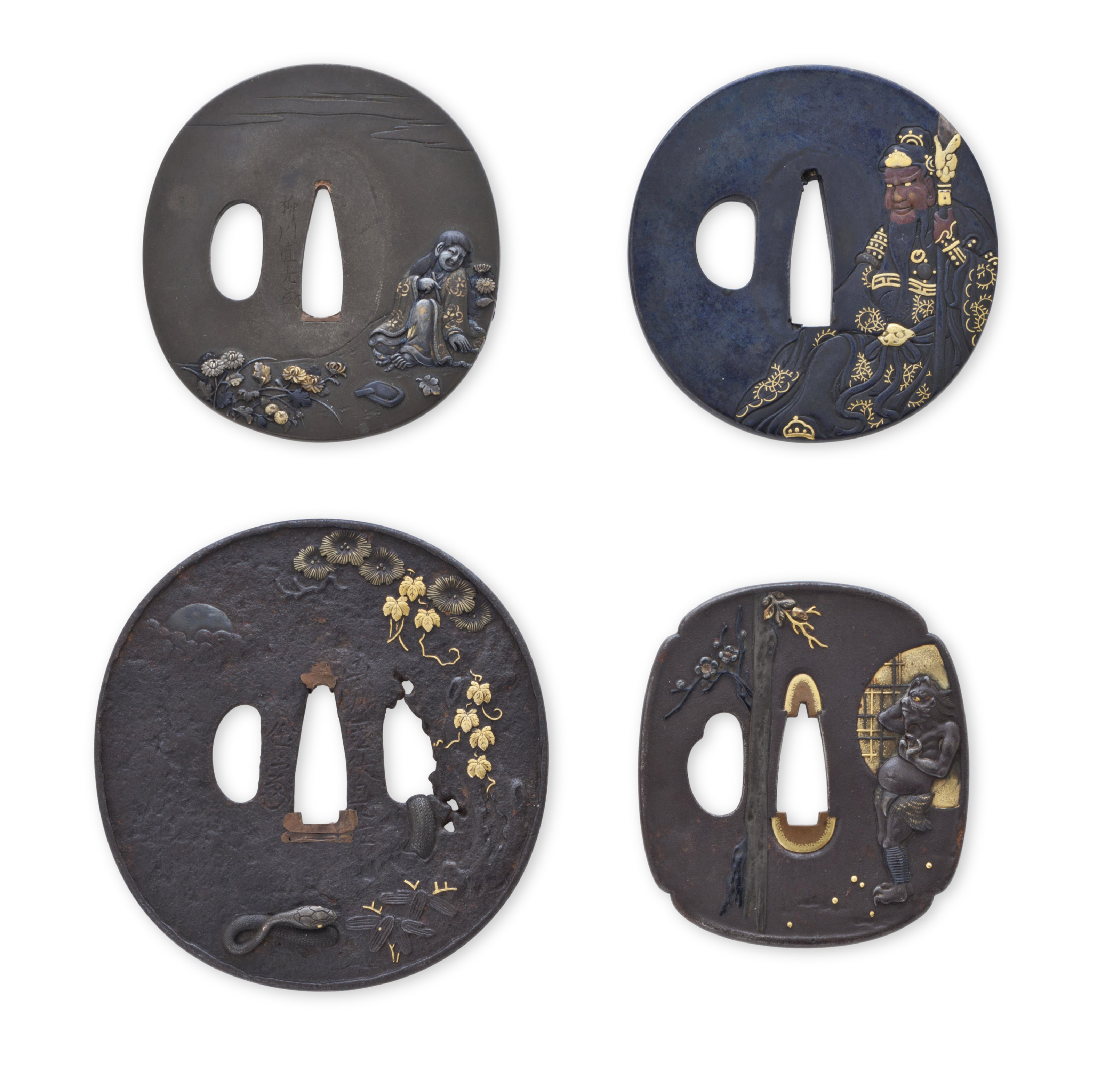 EDO PERIOD (19TH CENTURY), A group of four soft-metal and iron tsuba ...