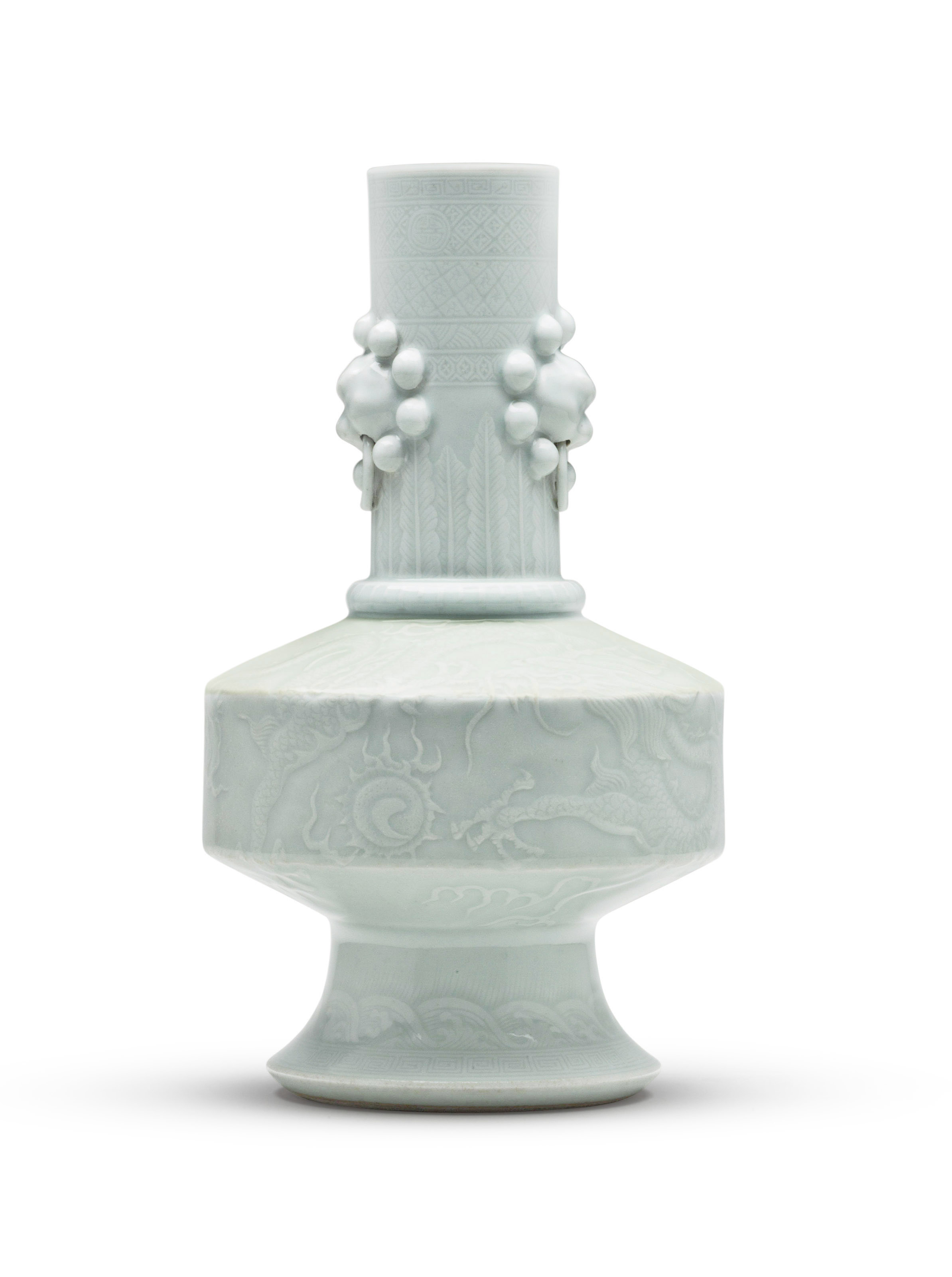 AN UNUSUAL PALE GREENISH-BLUE-GLAZED CARVED VASE, 19TH CENTURY | Christie’s