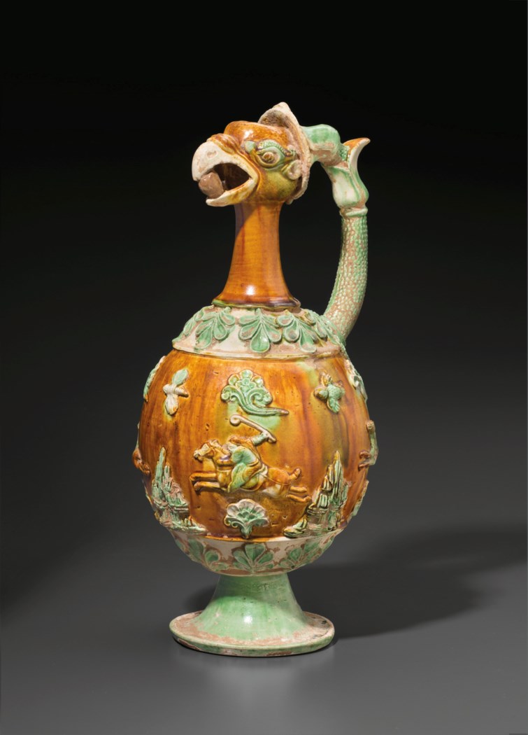 A VERY RARE SANCAI-GLAZED POTTERY PHOENIX-HEAD EWER