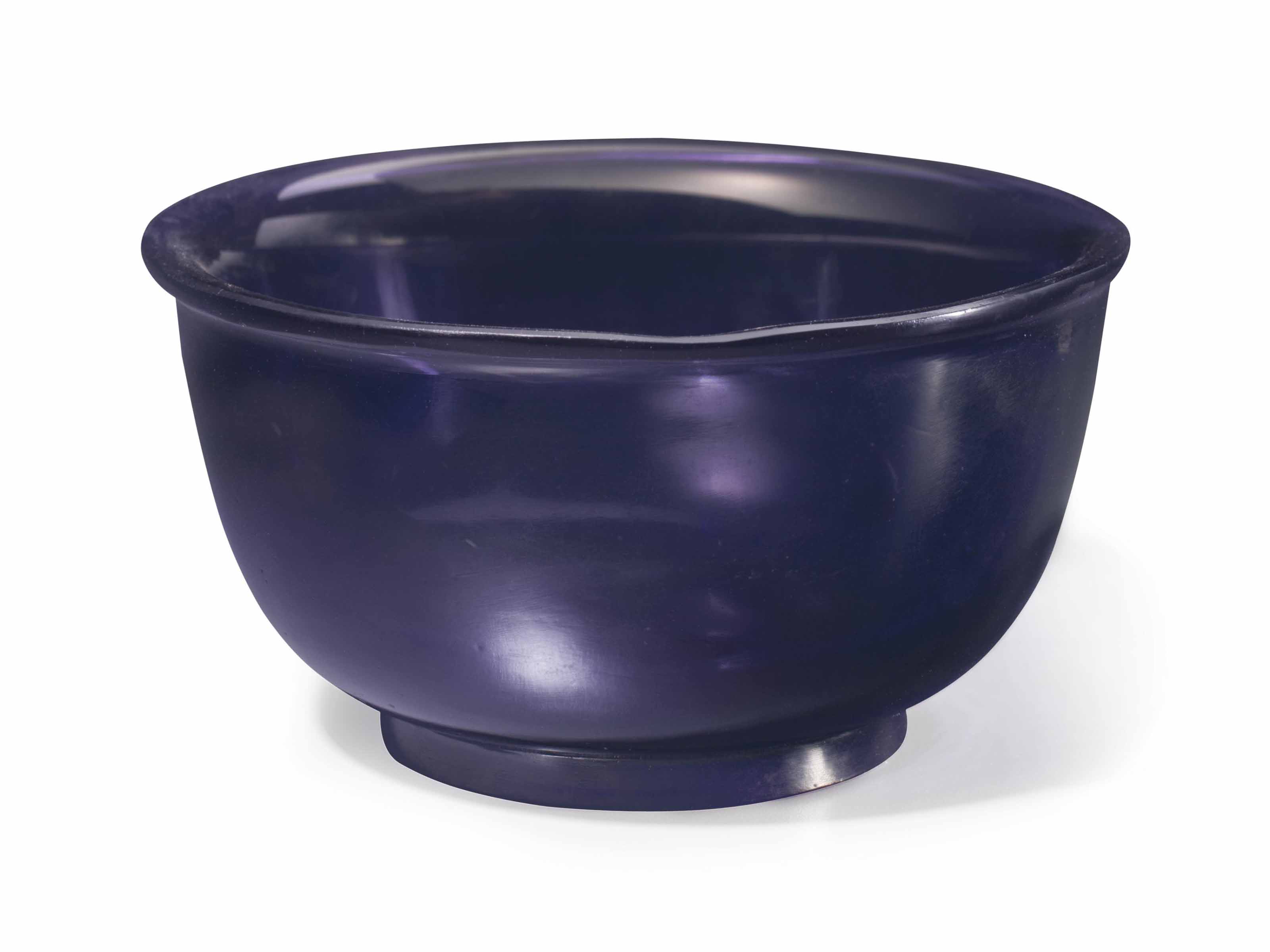 A SMALL PURPLE GLASS BOWL