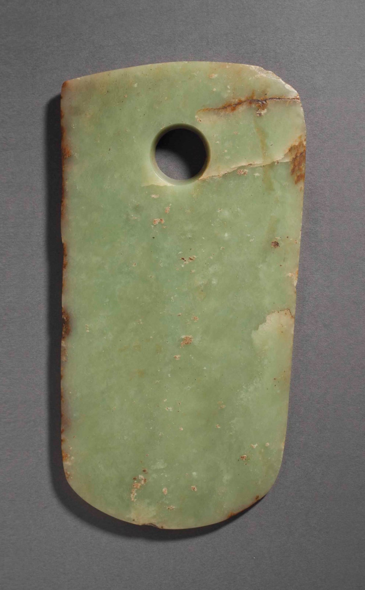 A LARGE GREENISH-YELLOW JADE AXE, CHINA, NEOLITHIC PERIOD-SHANG DYNASTY ...