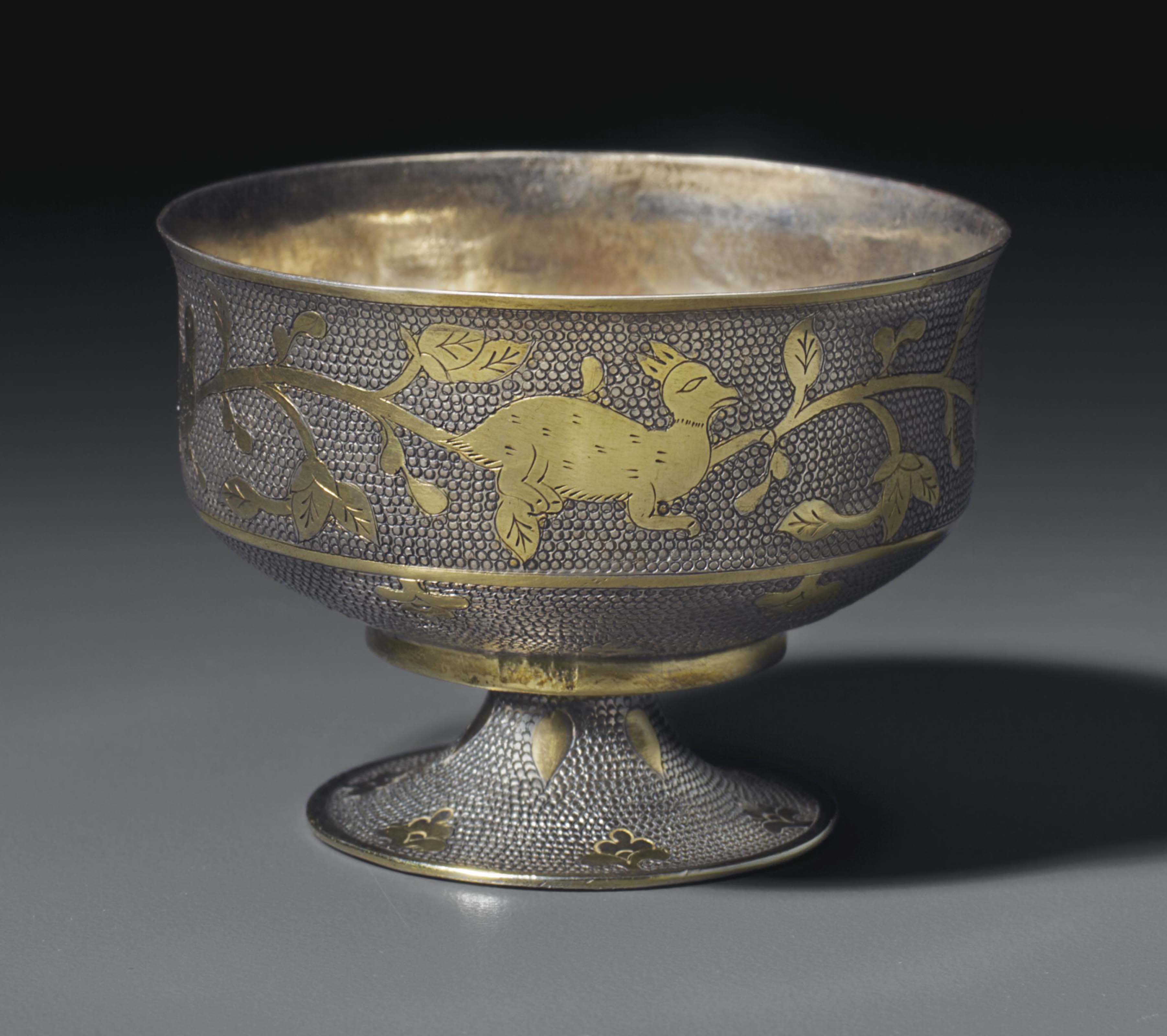 A SMALL PARCEL-GILT SILVER STEM CUP , CHINA, TANG DYNASTY (AD 618-907 ...
