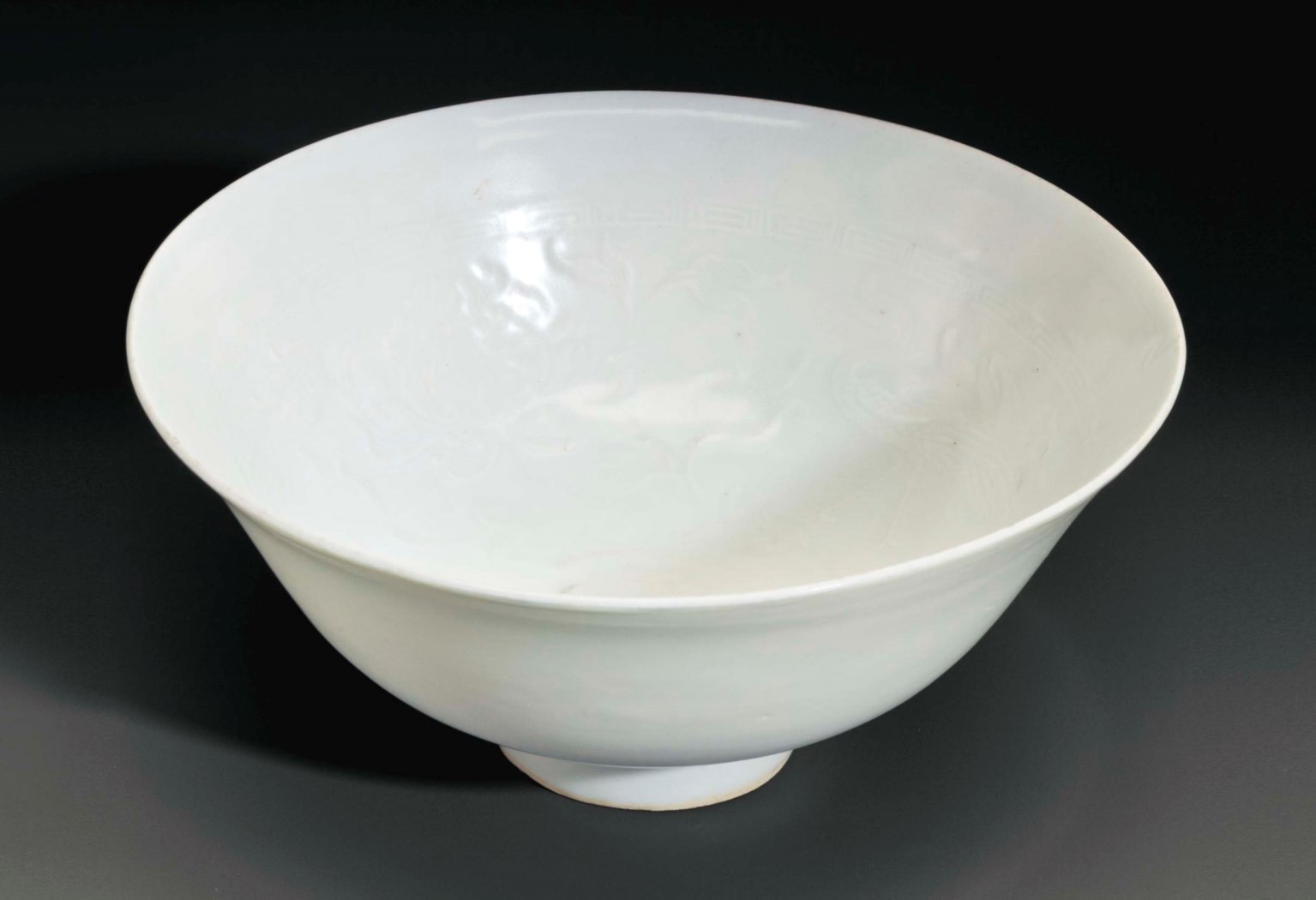 A SHUFU MOLDED DEEP BOWL, CHINA, YUAN DYNASTY (1279-1368) | Christie's