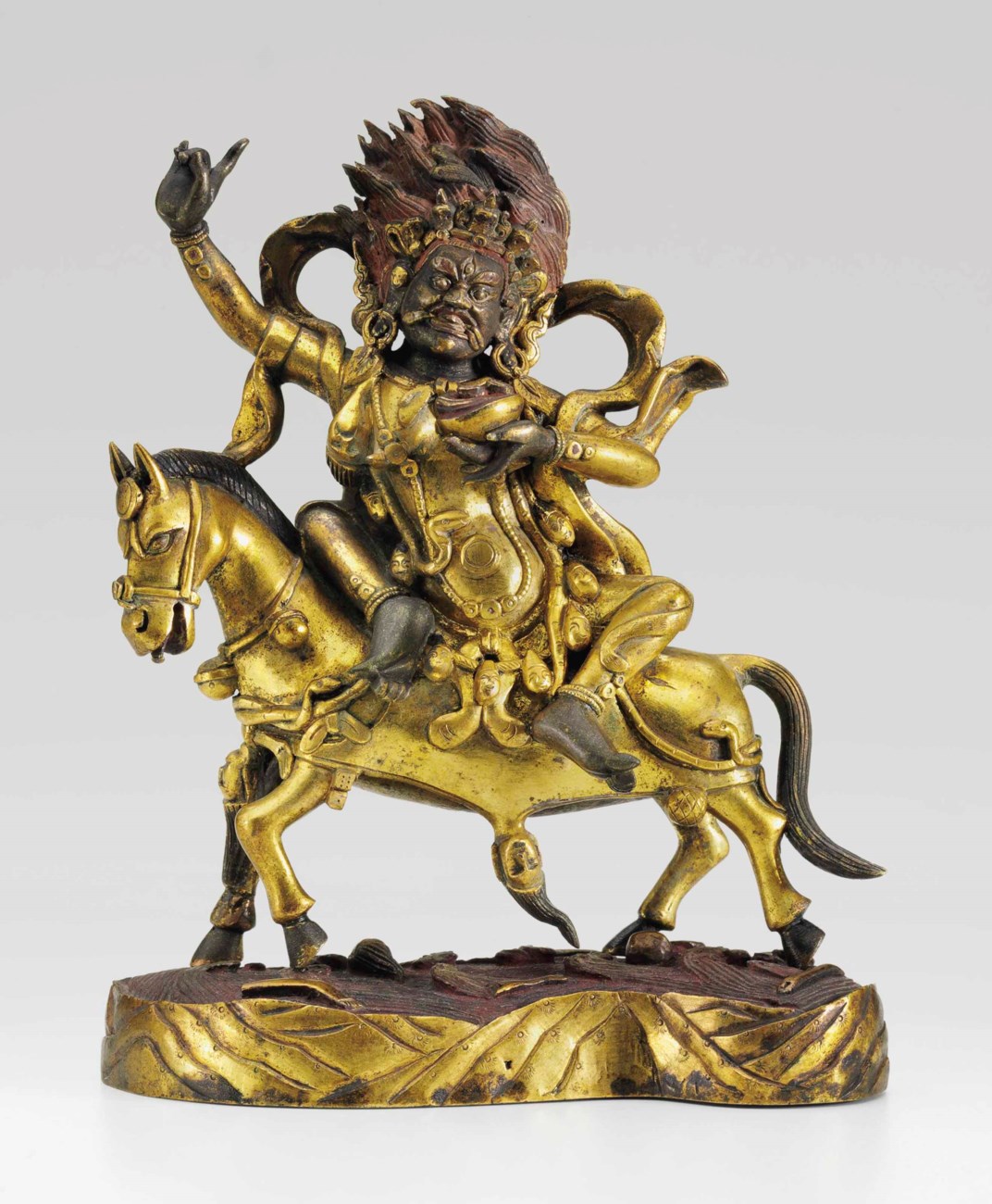A GILT BRONZE FIGURE OF PALDEN LHAMO, TIBET, 17TH CENTURY | Christie's