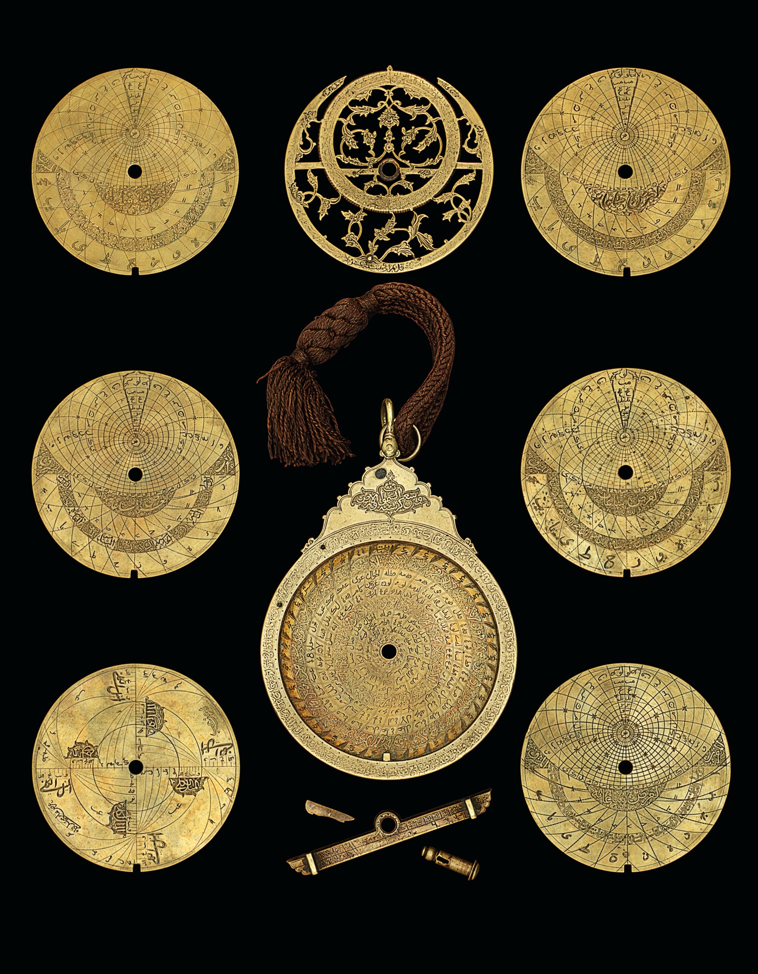 A FINE SAFAVID BRASS ASTROLABE, SIGNED MUHAMMAD MEHDI AL-YAZDI, IRAN ...