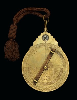 A FINE SAFAVID BRASS ASTROLABE, SIGNED MUHAMMAD MEHDI AL-YAZDI, IRAN ...